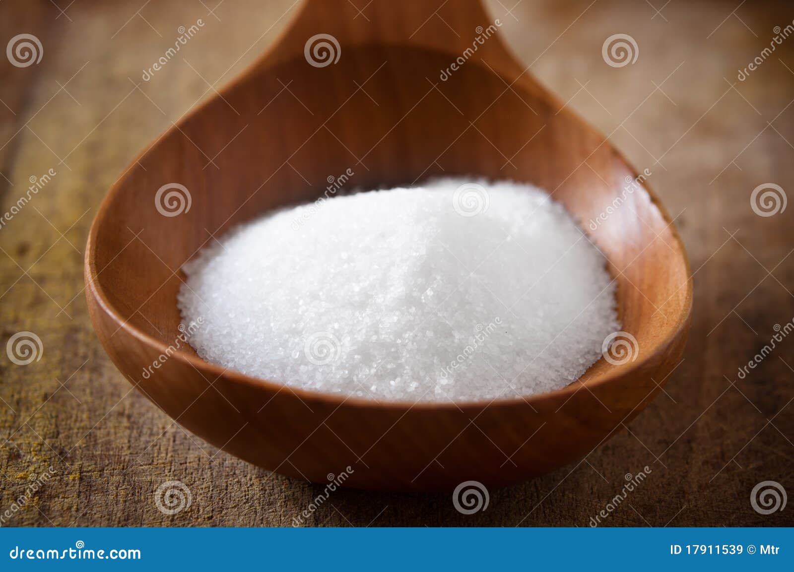Salt on wooden spoon stock image. Image of aromatic, seed - 17911539