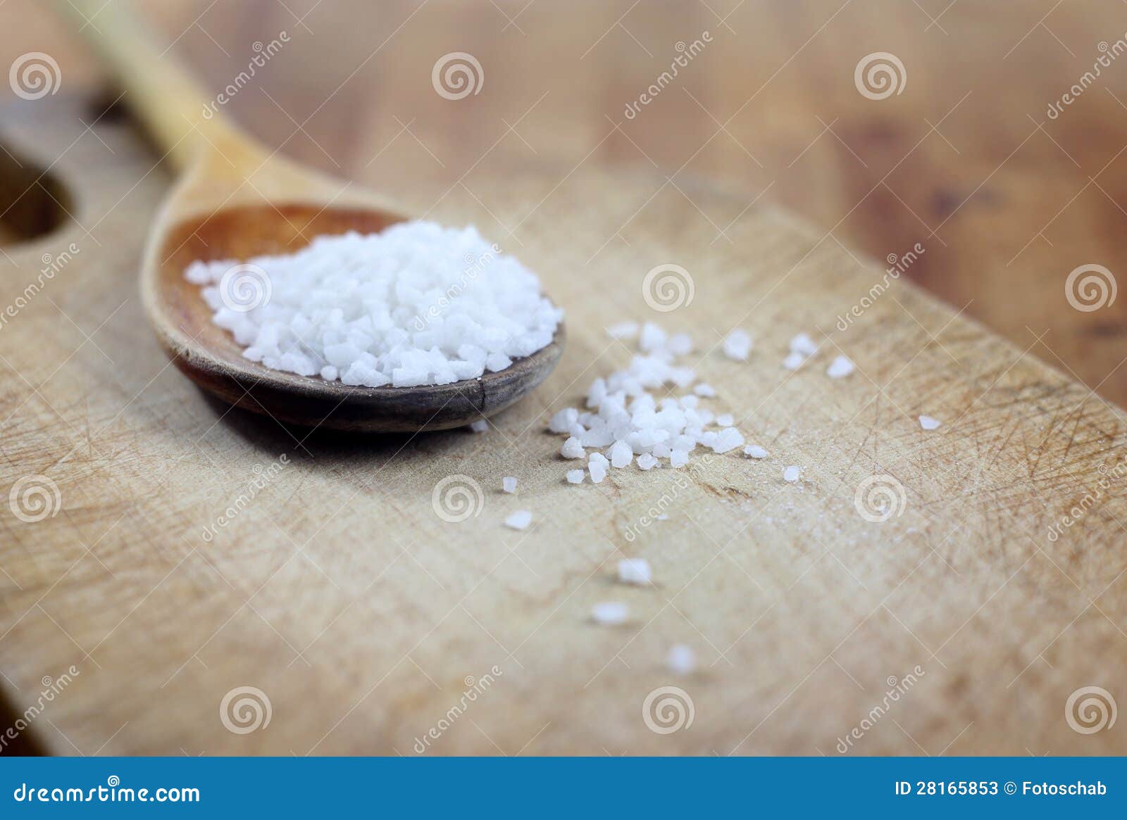 Salt in wooden spoon stock image. Image of heap, spoon - 28165853