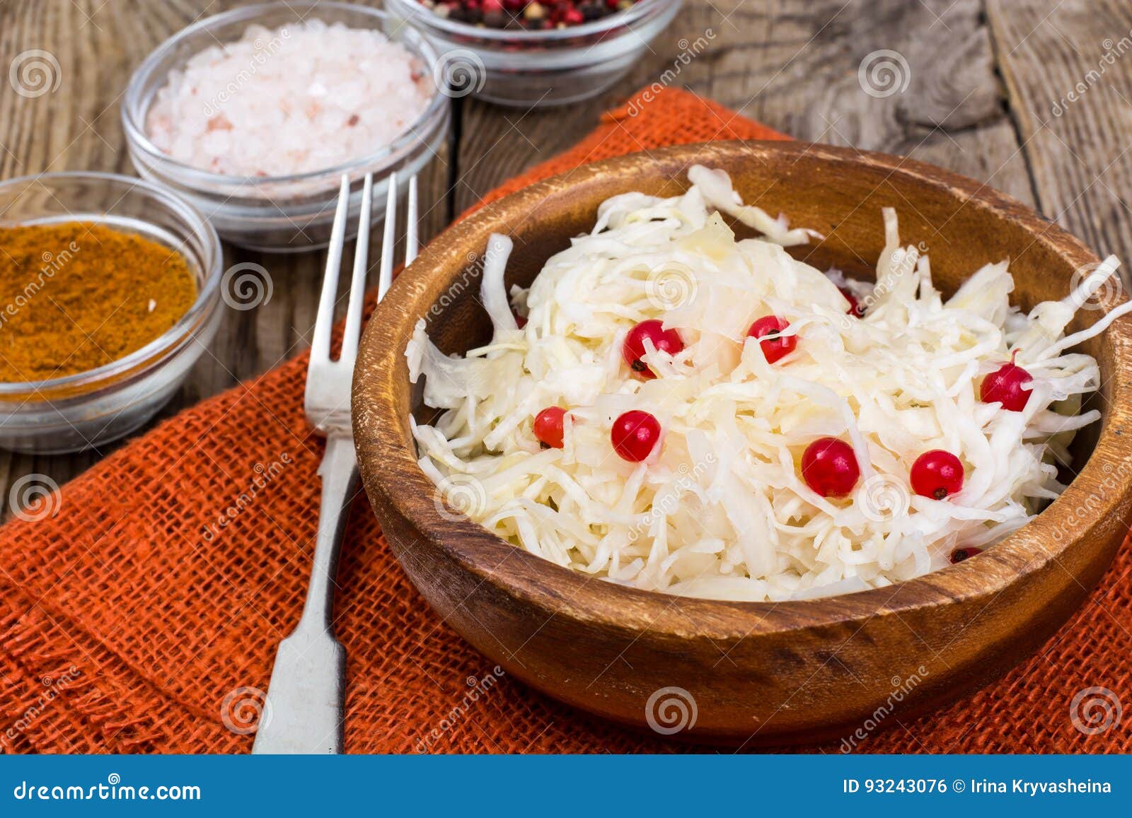 Salted Cabbage on Plate on the Background of Wooden Table Stock Photo ...