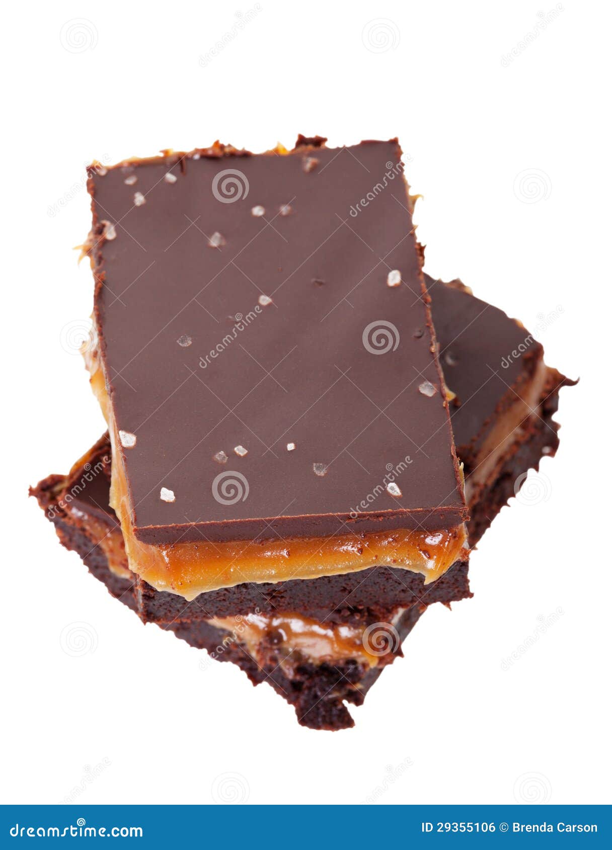 Chocolate, Caramel Flowing Beautiful Drops On A White Background ...