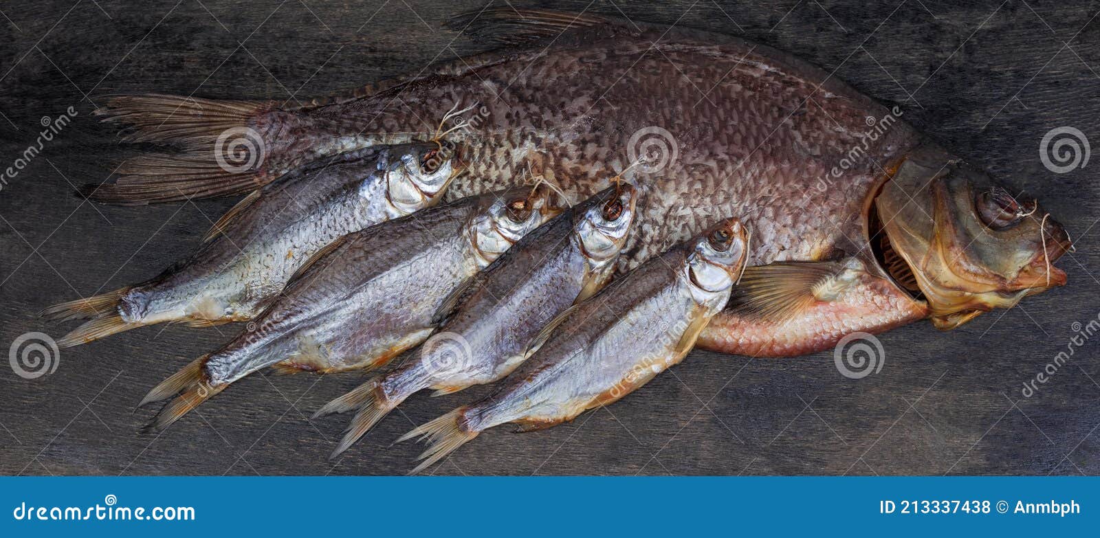 Salted and Dried Bream and Several Roach on Black Surface Stock Photo ...