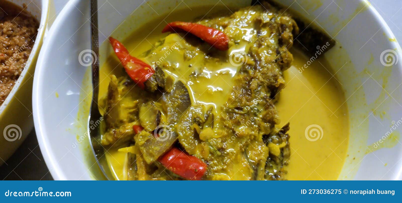 Salted Fish Cooked with Santan and Tumeric Stock Image - Image of ...