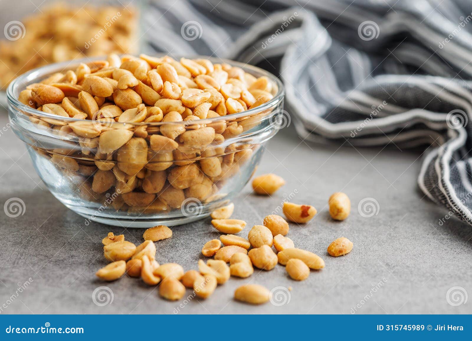 Salted Roasted Peanuts in Bowl on Kitchen Table Stock Image - Image of ...