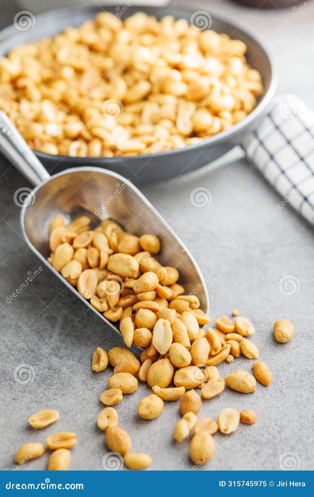 Salted Roasted Peanuts in Scoop on Kitchen Table Stock Image - Image of ...