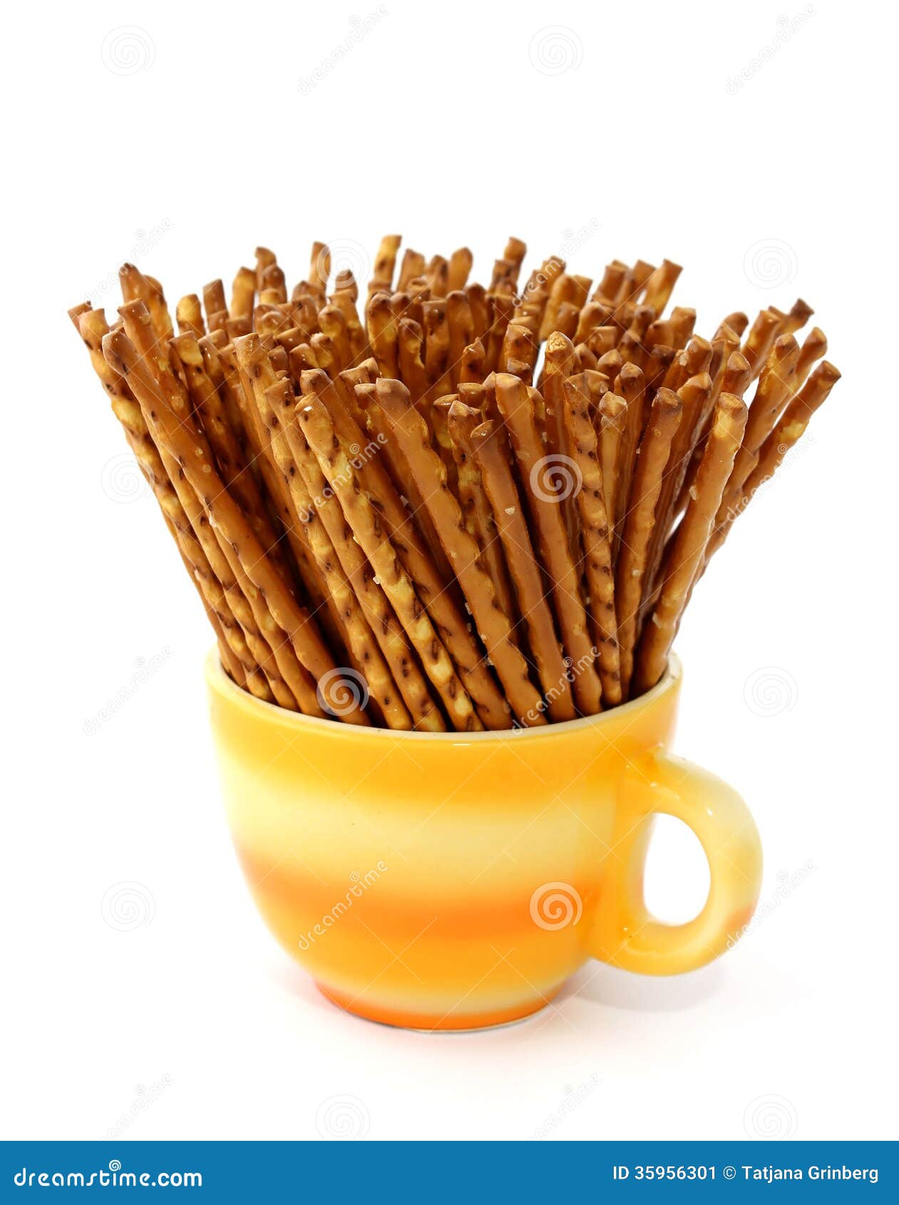 Salted Sticks In Yellow Cup Isolated On White Stock Image - Image of ...