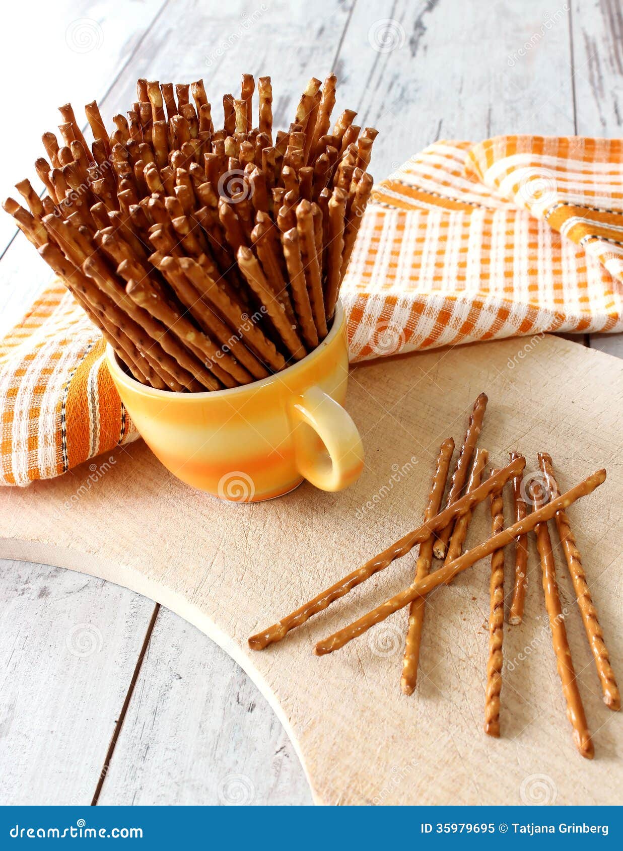 Salted Sticks in Yellow Cup on Wooden Stock Image - Image of bread ...