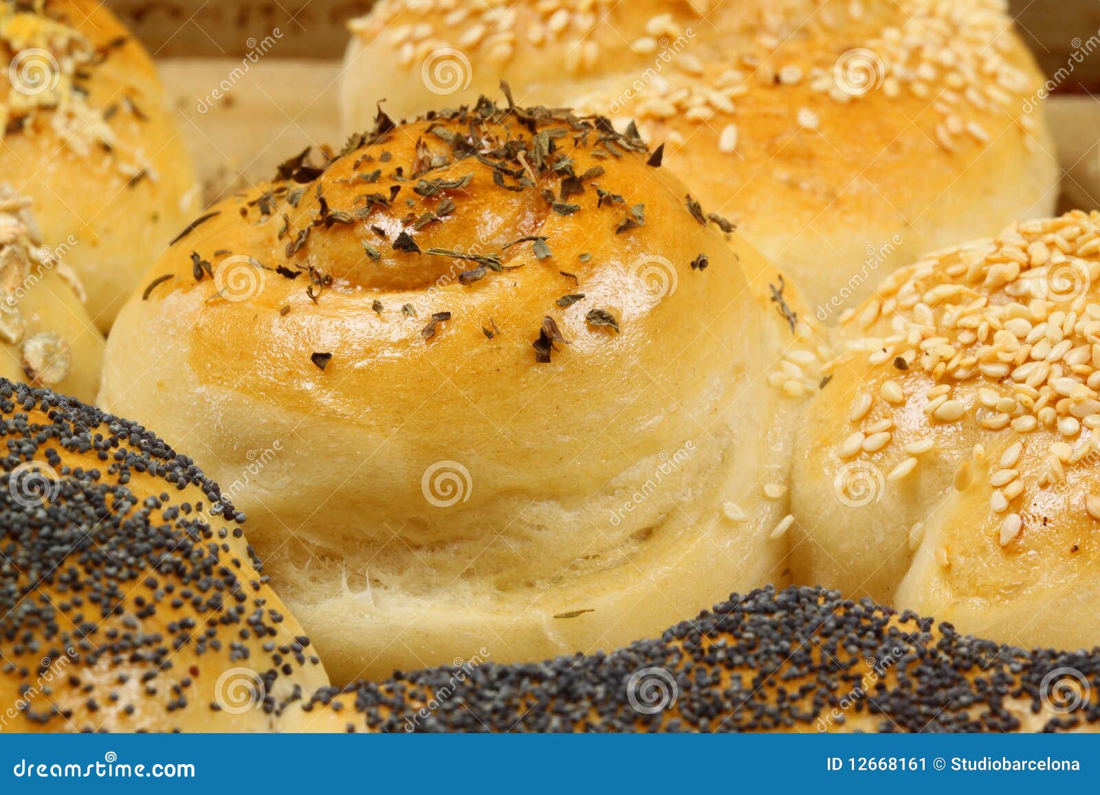 Salty Buns Sprinkled with Herbs and Seeds Stock Image - Image of ...