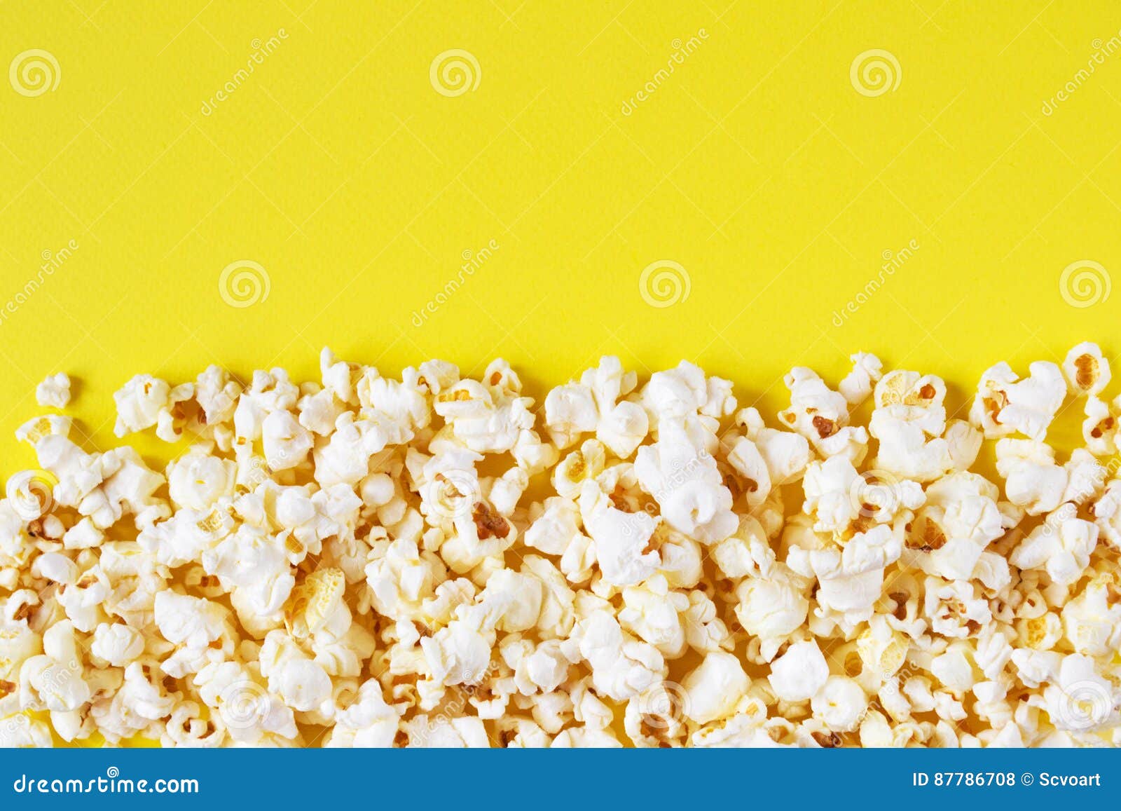 Salty Popcorn on Yellow Background Stock Photo - Image of retro, junk ...