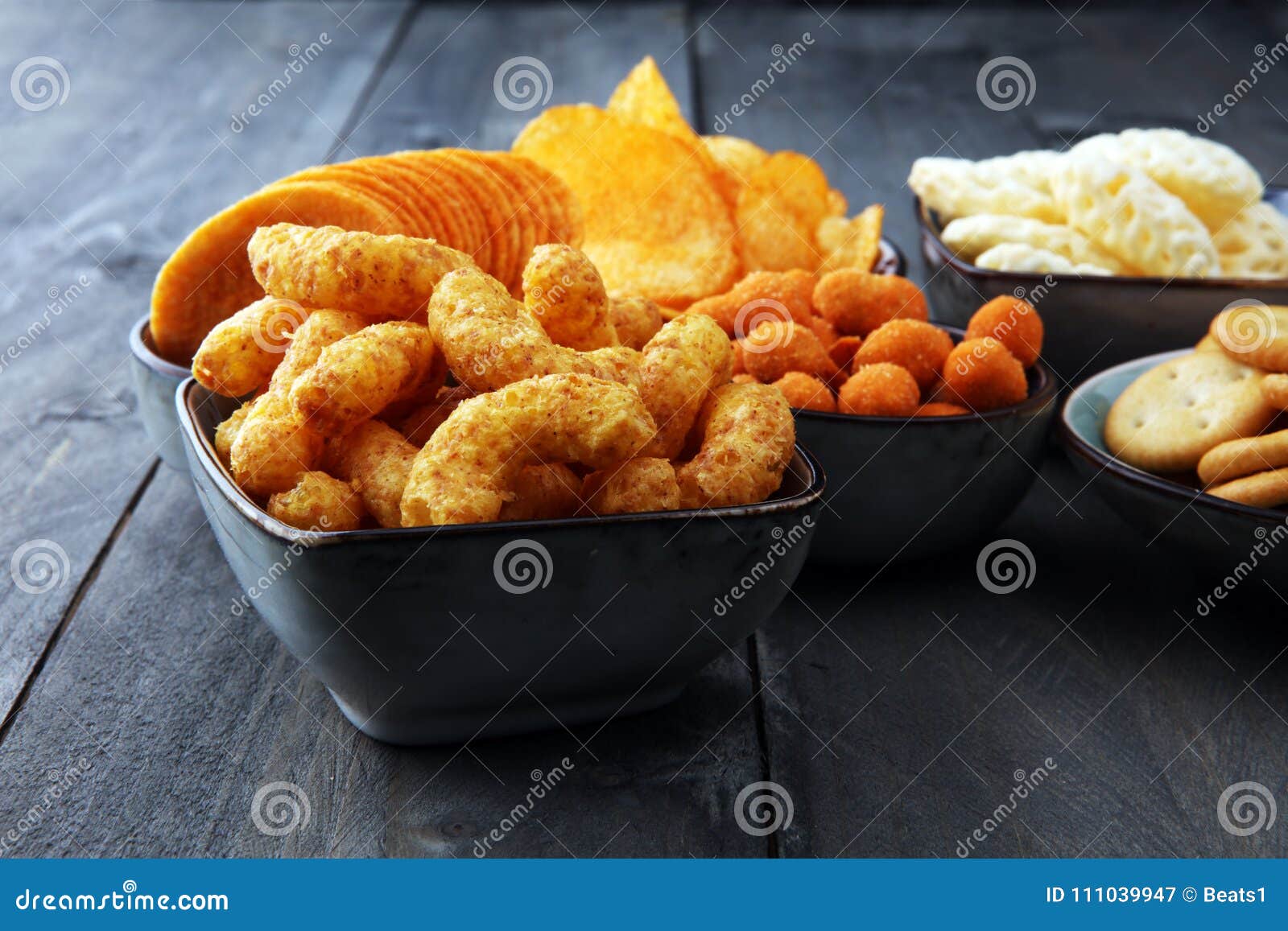 Salty Snacks. Pretzels, Chips, Crackers in Bowls. Stock Image - Image ...