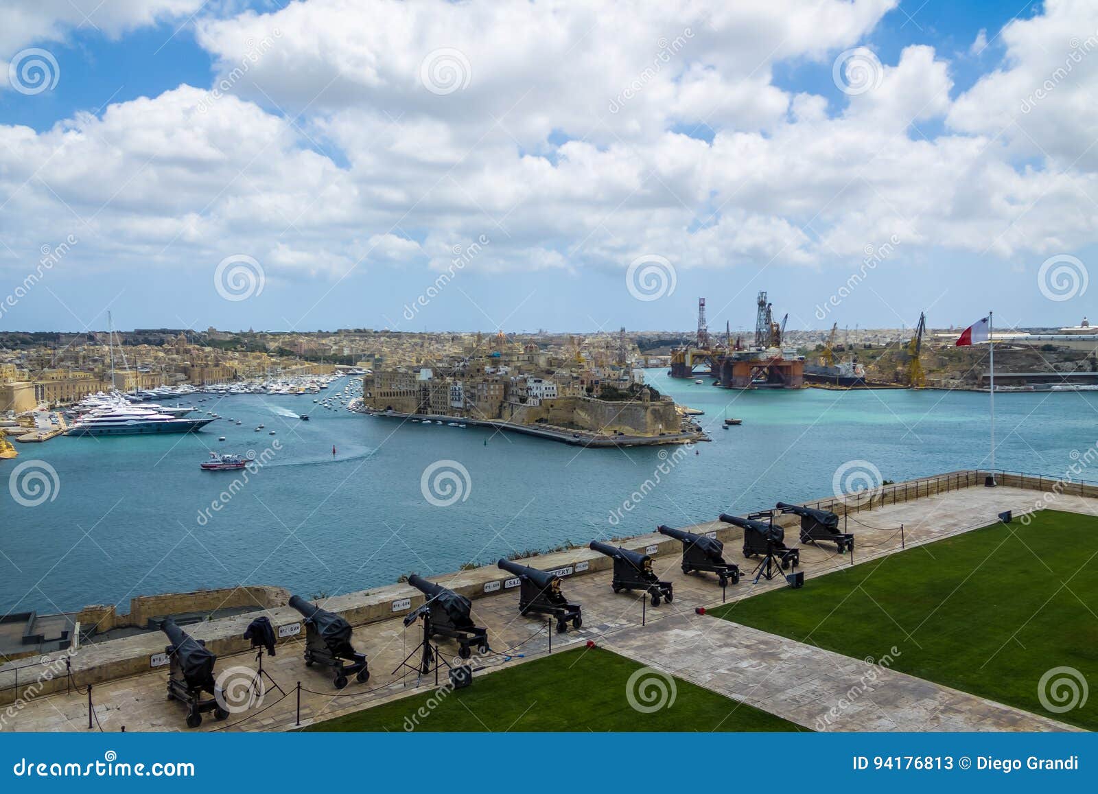 The Saluting Battery Canons and Grand Harbour - Valletta, Malta Stock ...
