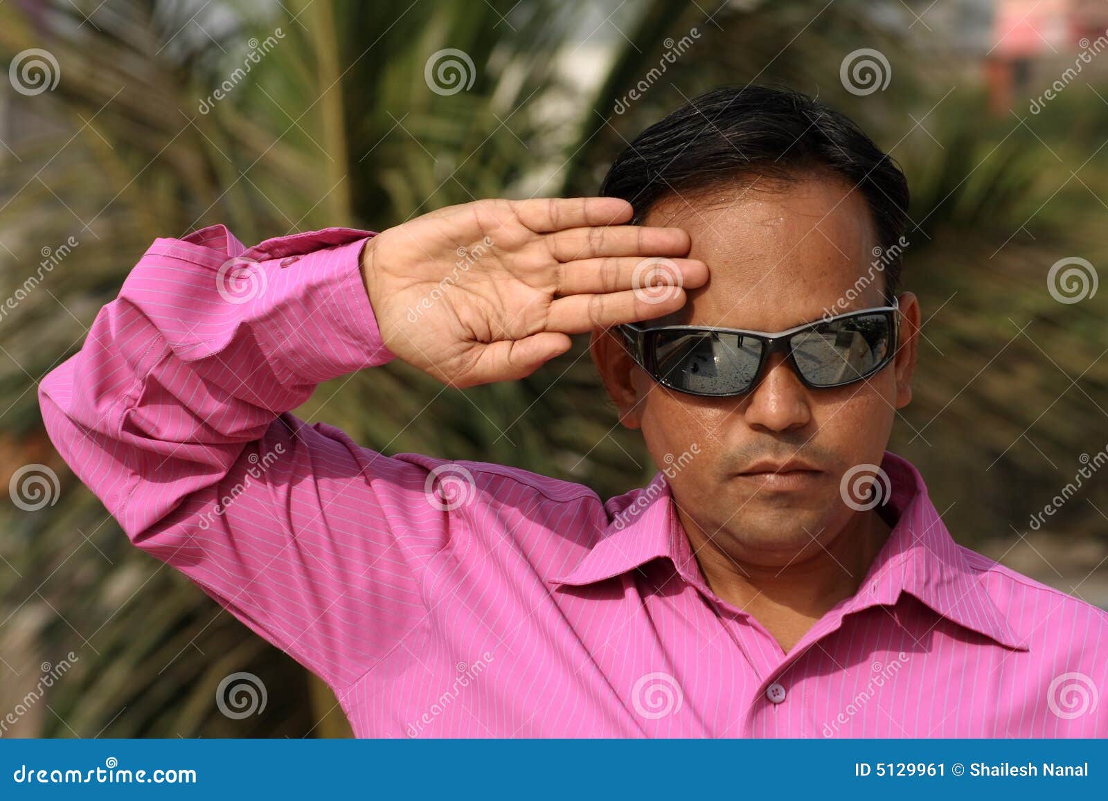 Saluting with right hand stock image. Image of dark, expression - 5129961