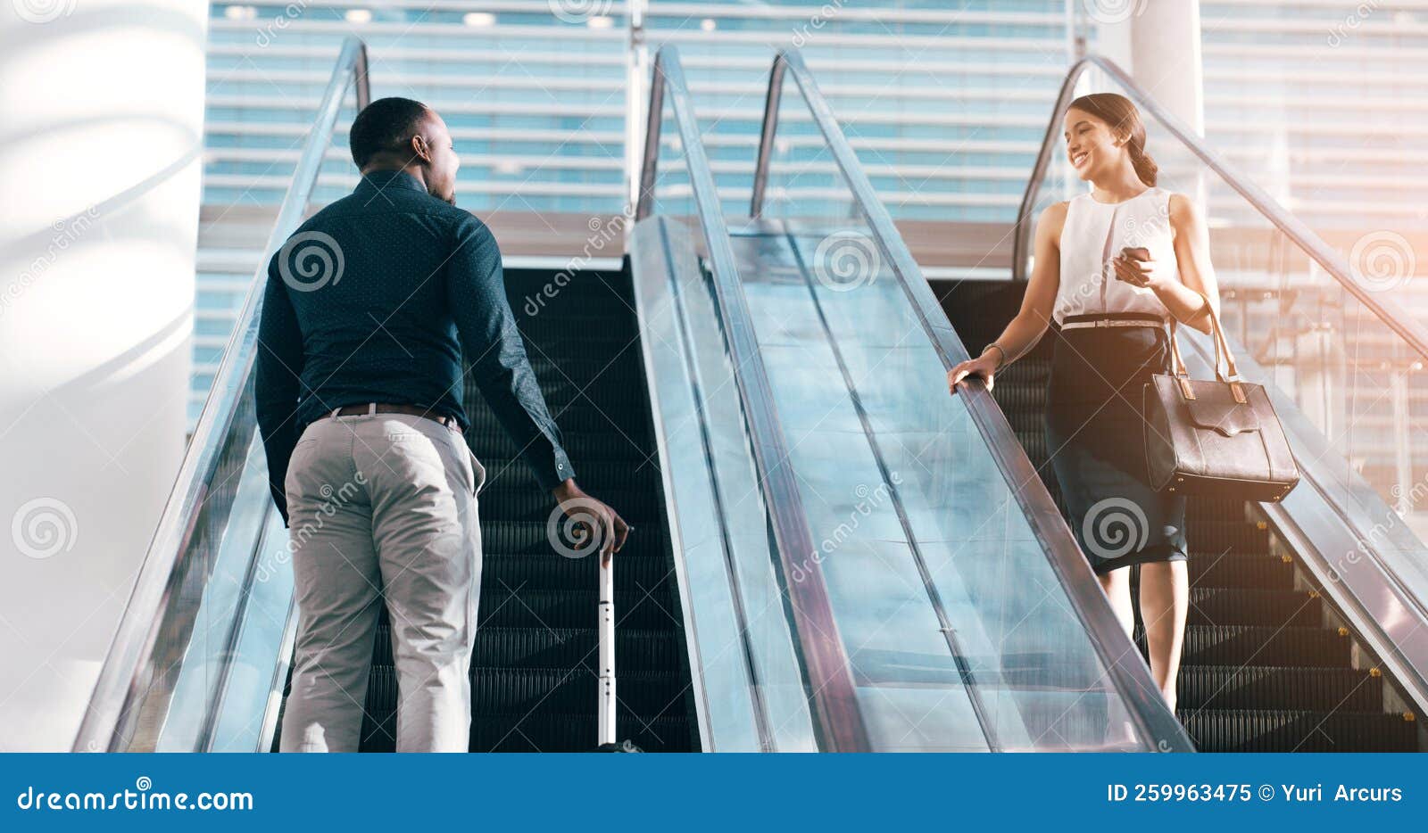 Same Goal, Different Paths. Two Young Businesspeople Greeting while ...