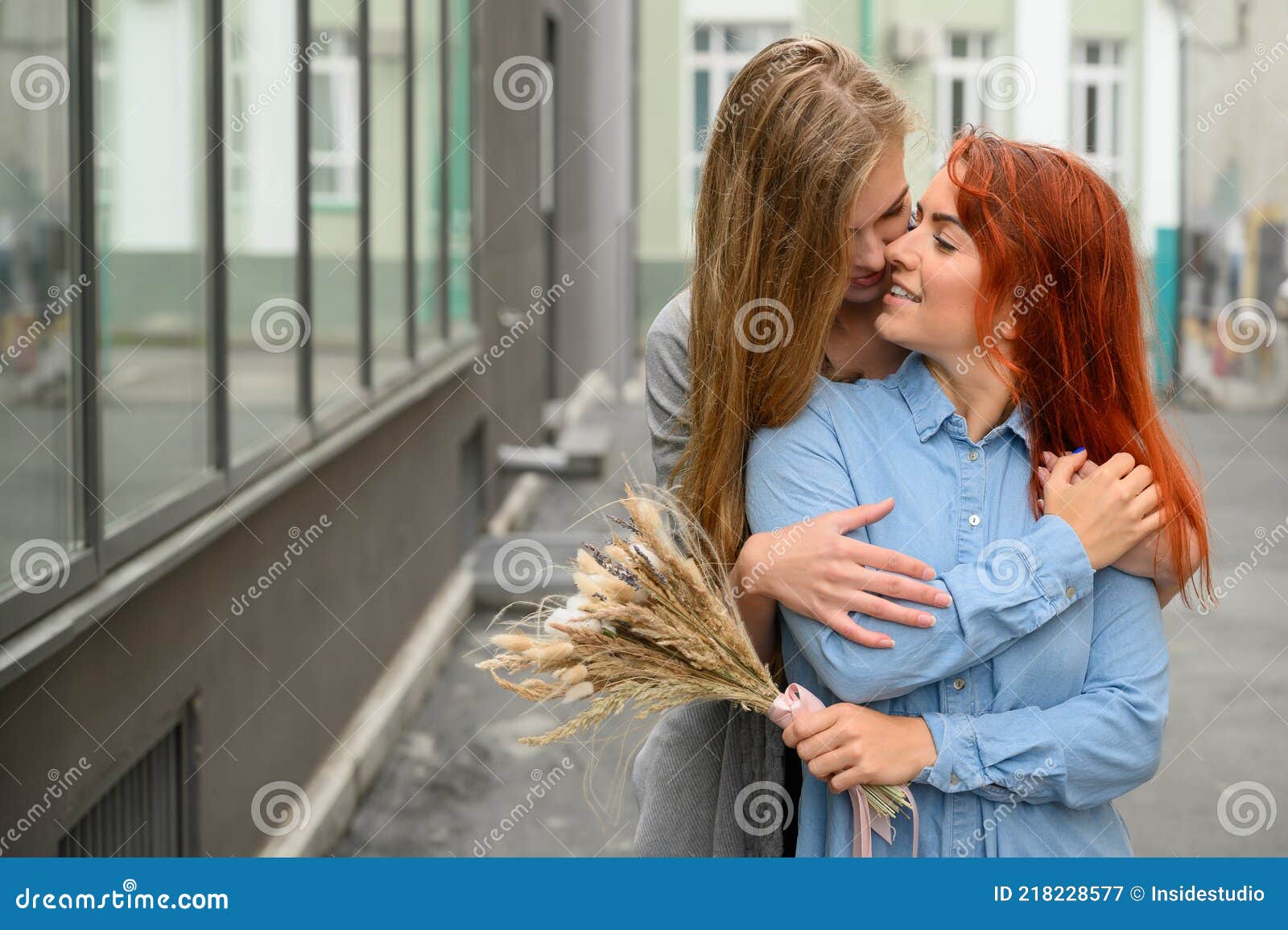 Same Sex Relationships Happy Lesbian Couple With Dried Flowers Stock