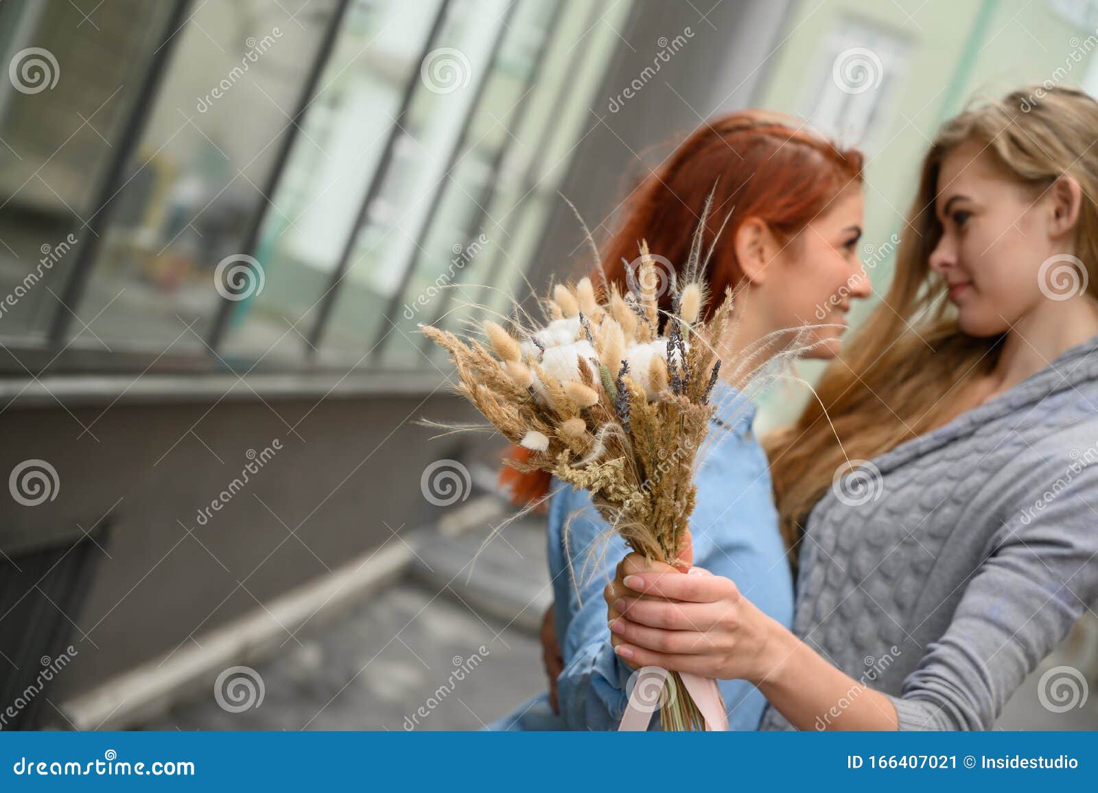 Same Sex Relationships Happy Lesbian Couple With Dried Flowers Stock