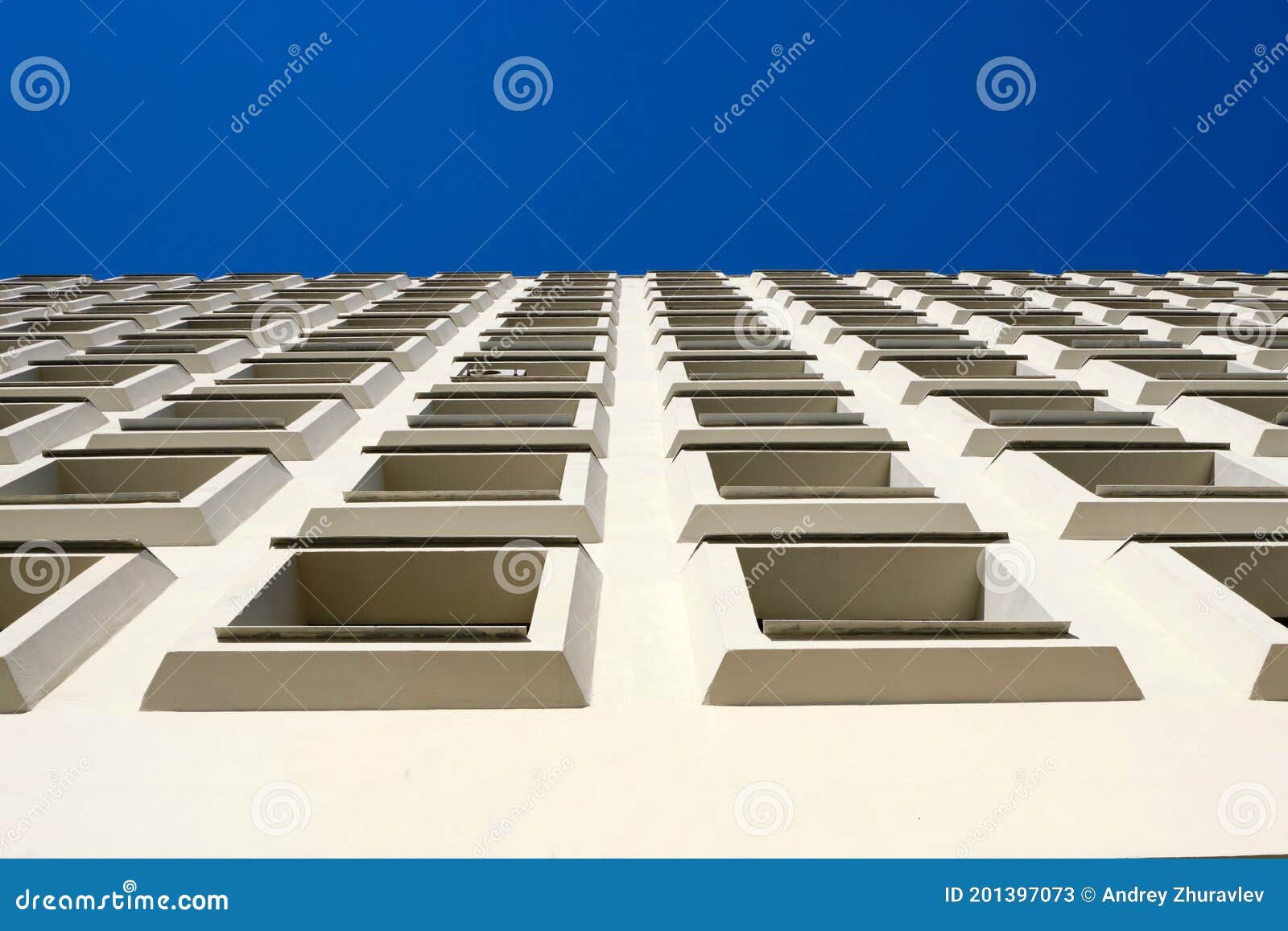 The Same Windows of a Concrete Building Rising Upward at an Angle To ...