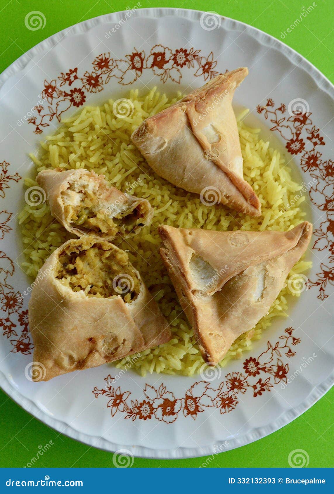 Samosas on a Bed of Saffron Rice. Stock Image - Image of delicious ...