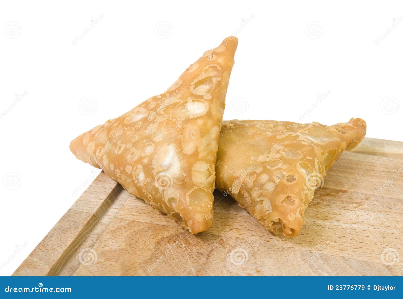 Samosas on chopping board stock image. Image of healthy - 23776779