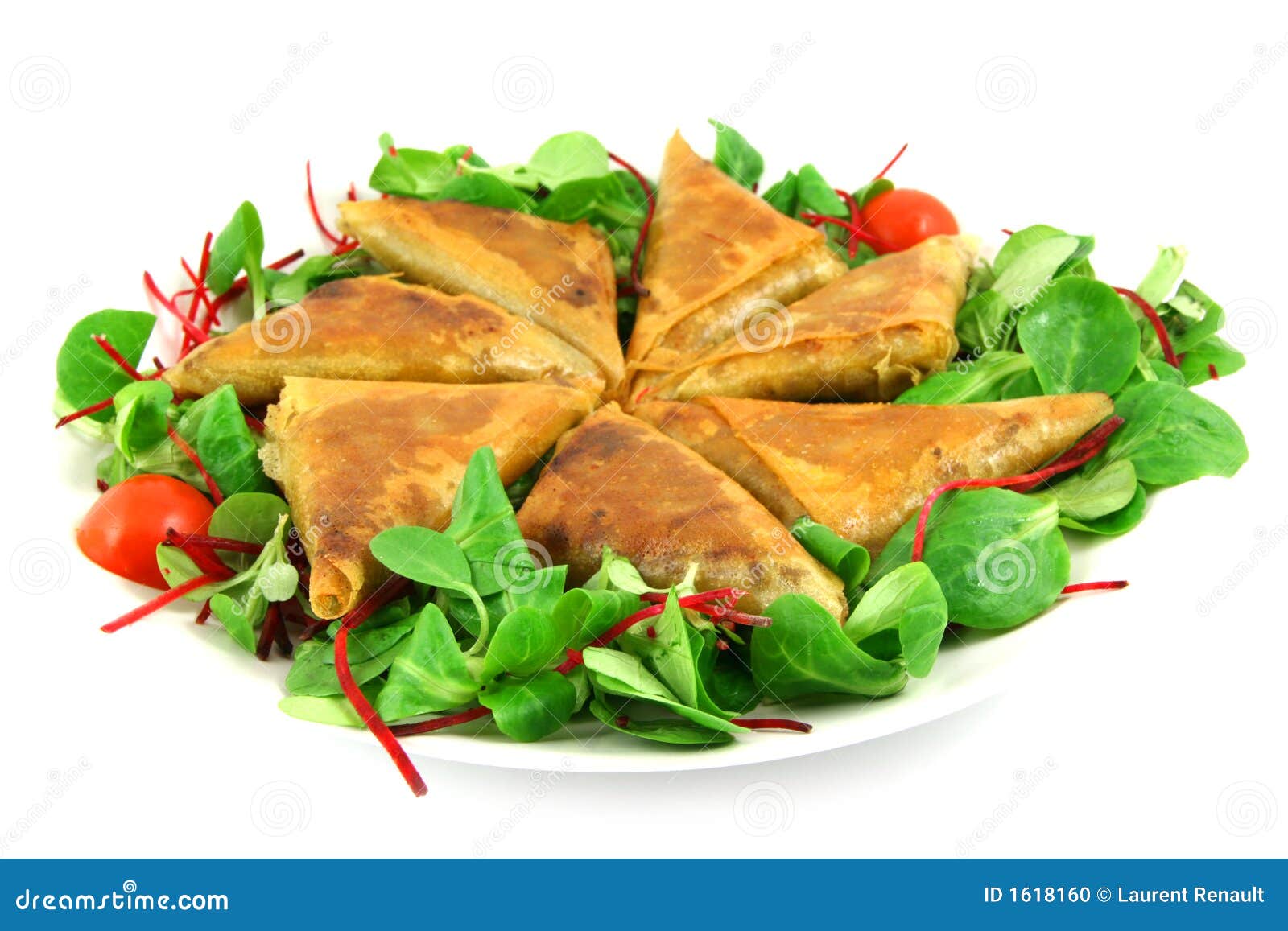 Samosas on a plate stock photo. Image of brick, tasty - 1618160