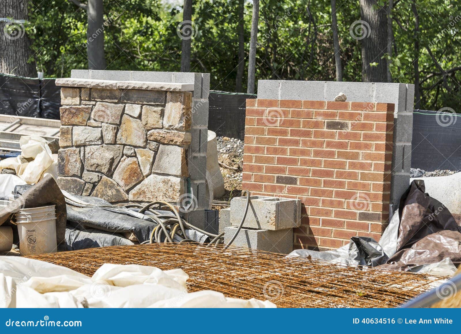Sample Brick and Stone Walls on a Construction Site Stock Photo - Image ...