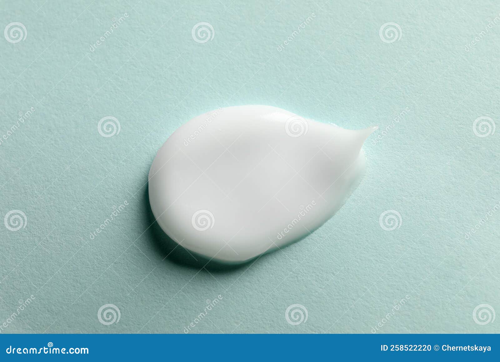 Sample of Face Cream on Light Blue Background, Top View Stock Photo ...