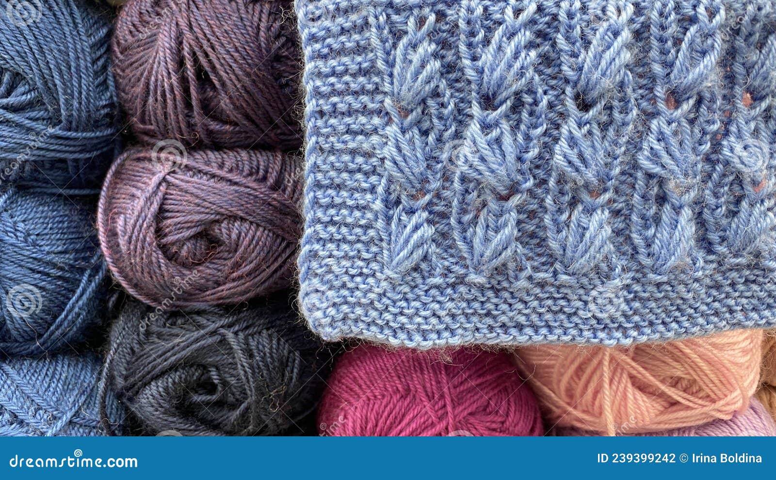 A Sample of Knitting a Pattern of Blue Wool. Skeins of Wool Stock Photo ...