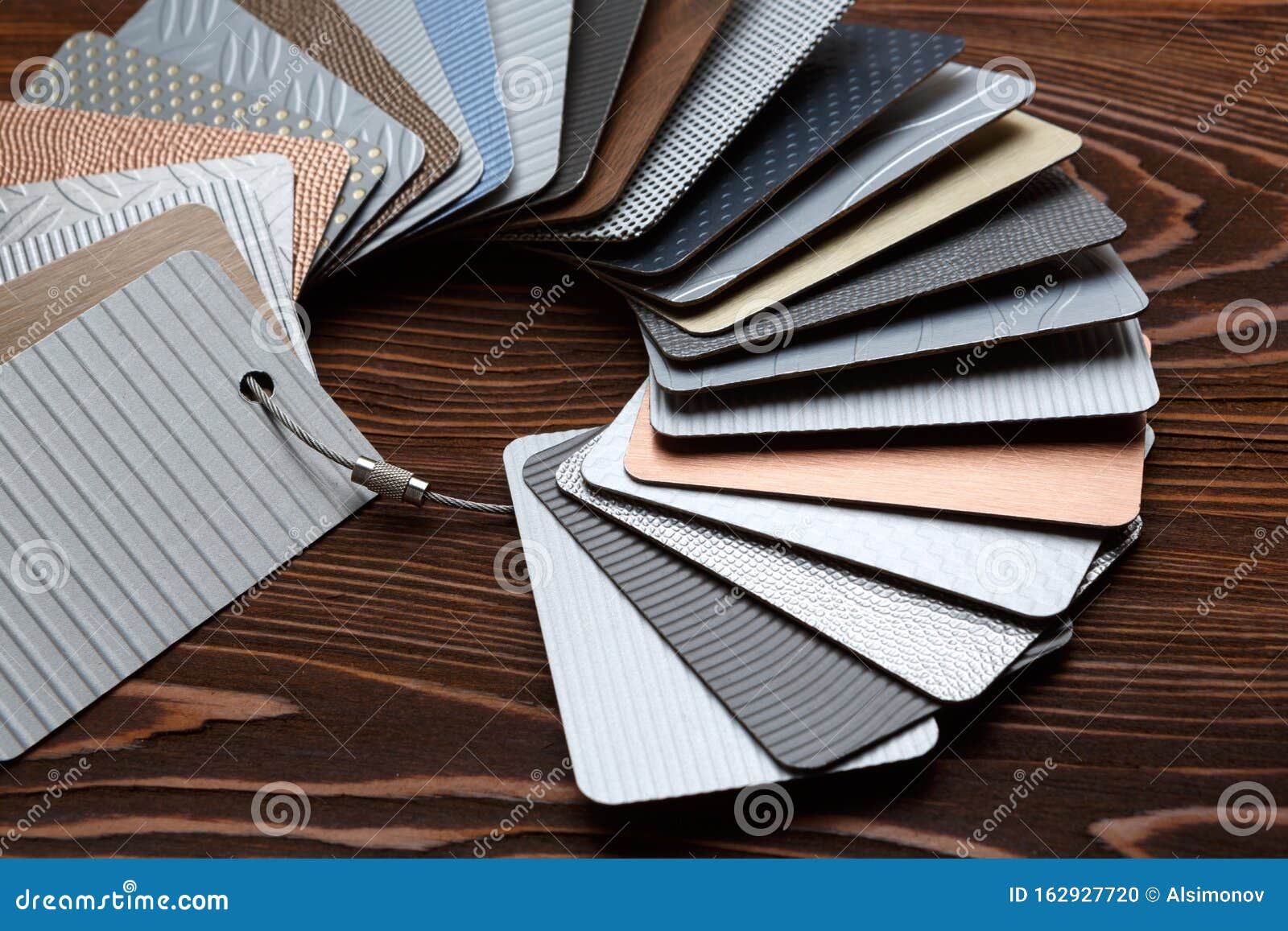 Samples of Metal Laminate Laid Out in the Form of a Circle on a Brown ...