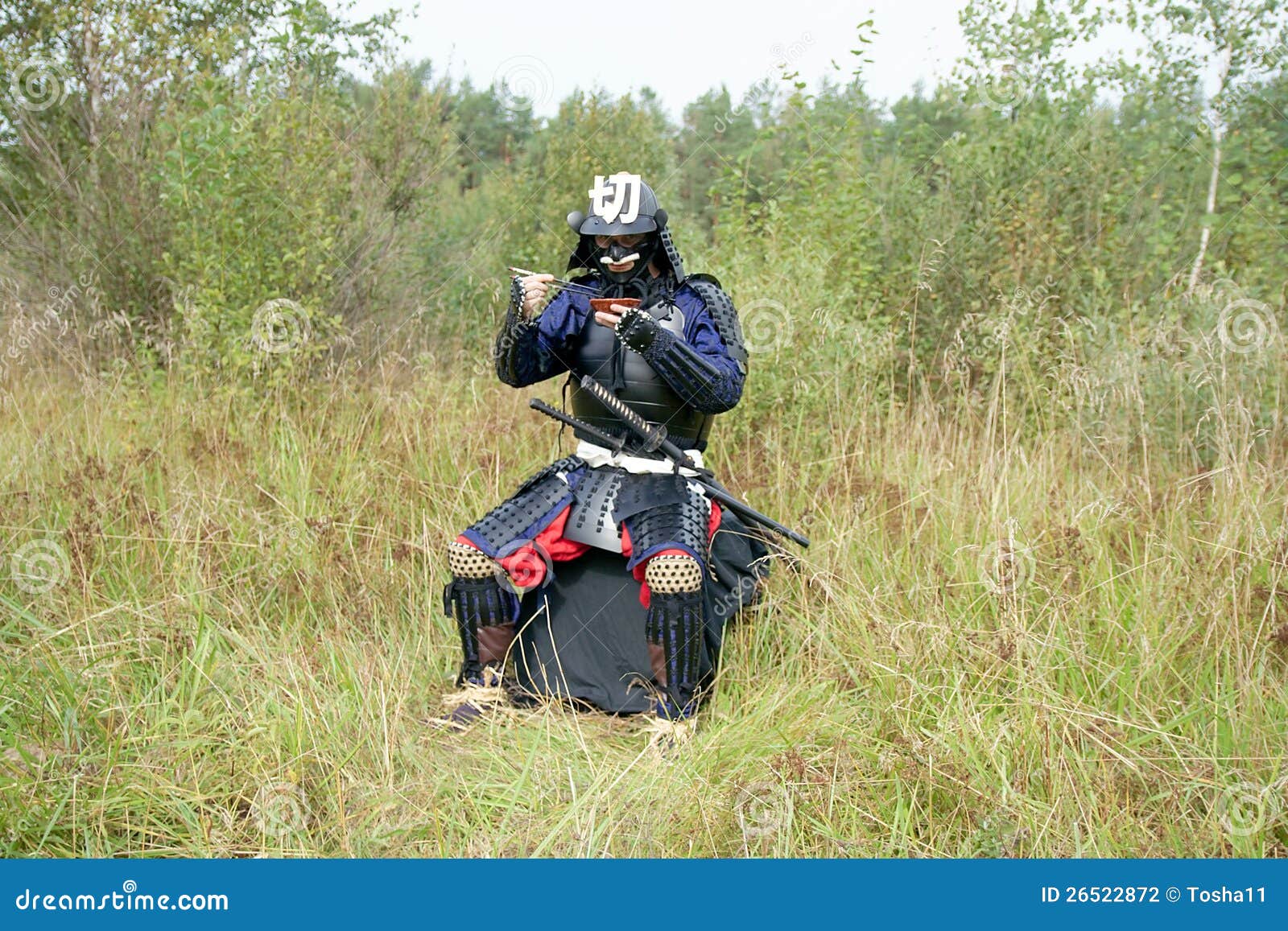 Samurai Eating from Earthen Dish Using Chopsticks Stock Photo - Image ...