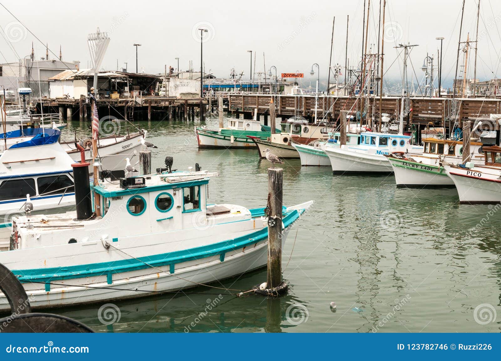 Small Wooden Fishing Boats Tied Up at a Pier Editorial Photo - Image of ... Small Wooden Fishing Boats Tied Up at a Pier Editorial Photo - Image of ...