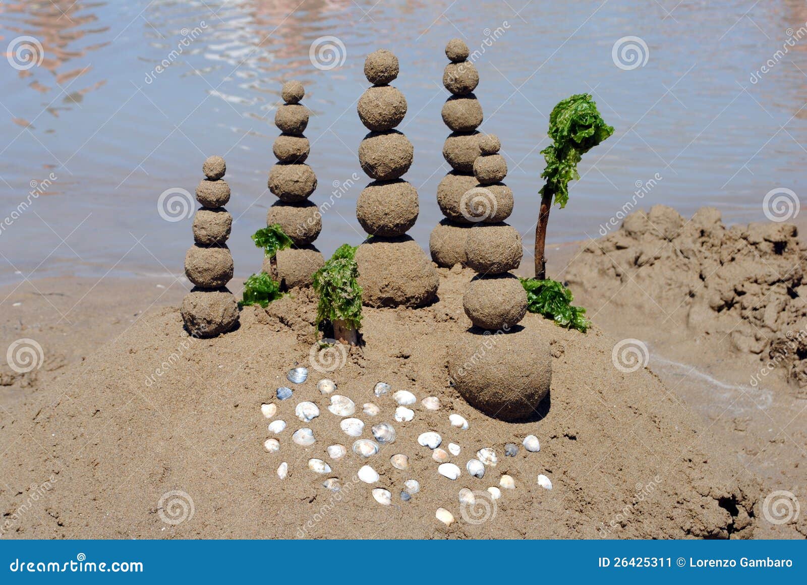 Sand balls on the beach stock image. Image of summer - 26425311