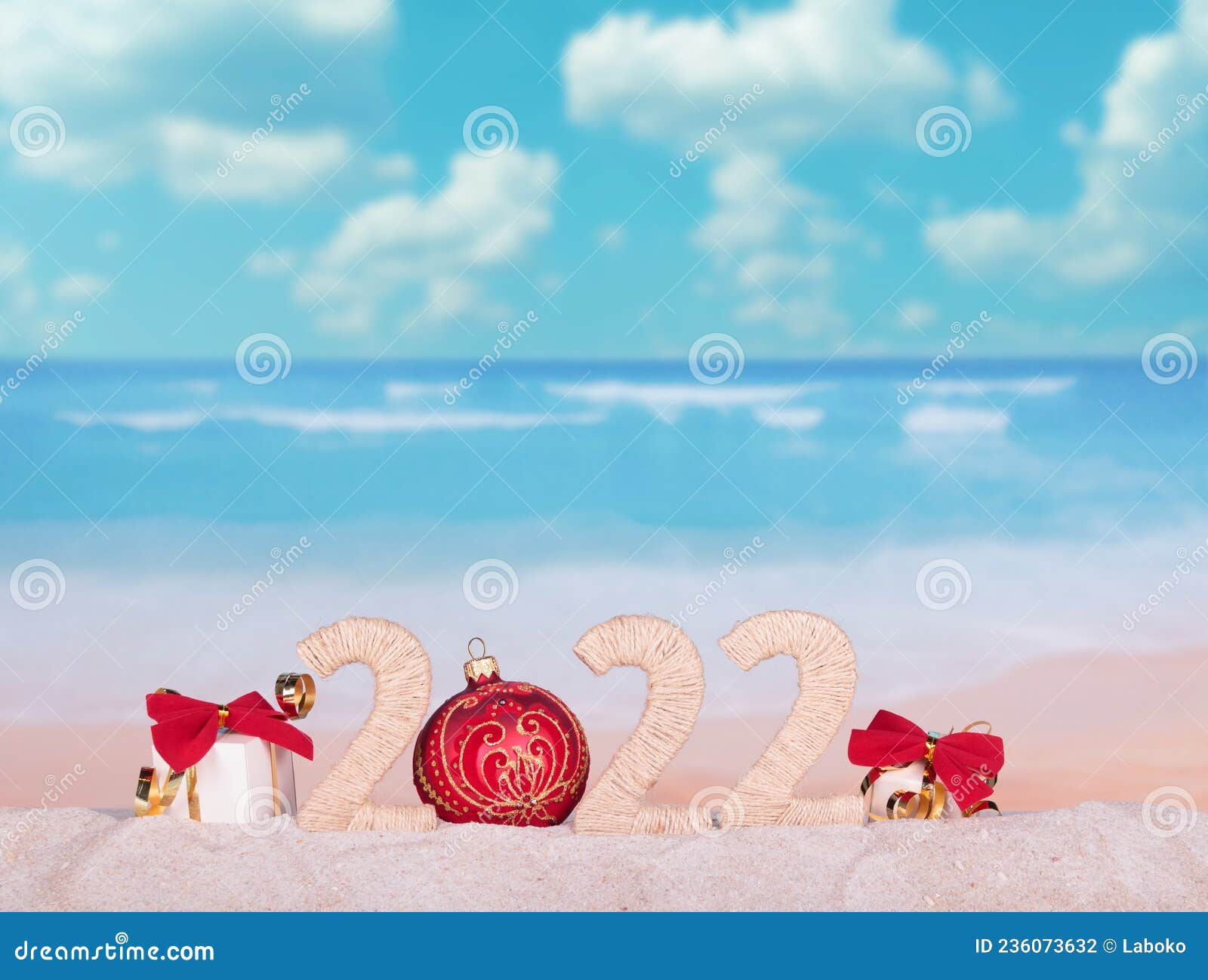 2022 in Sand on the Beach of the Sea. Gifts and Christmas Ball Stock ... 2022 in Sand on the Beach of the Sea. Gifts and Christmas Ball Stock ...