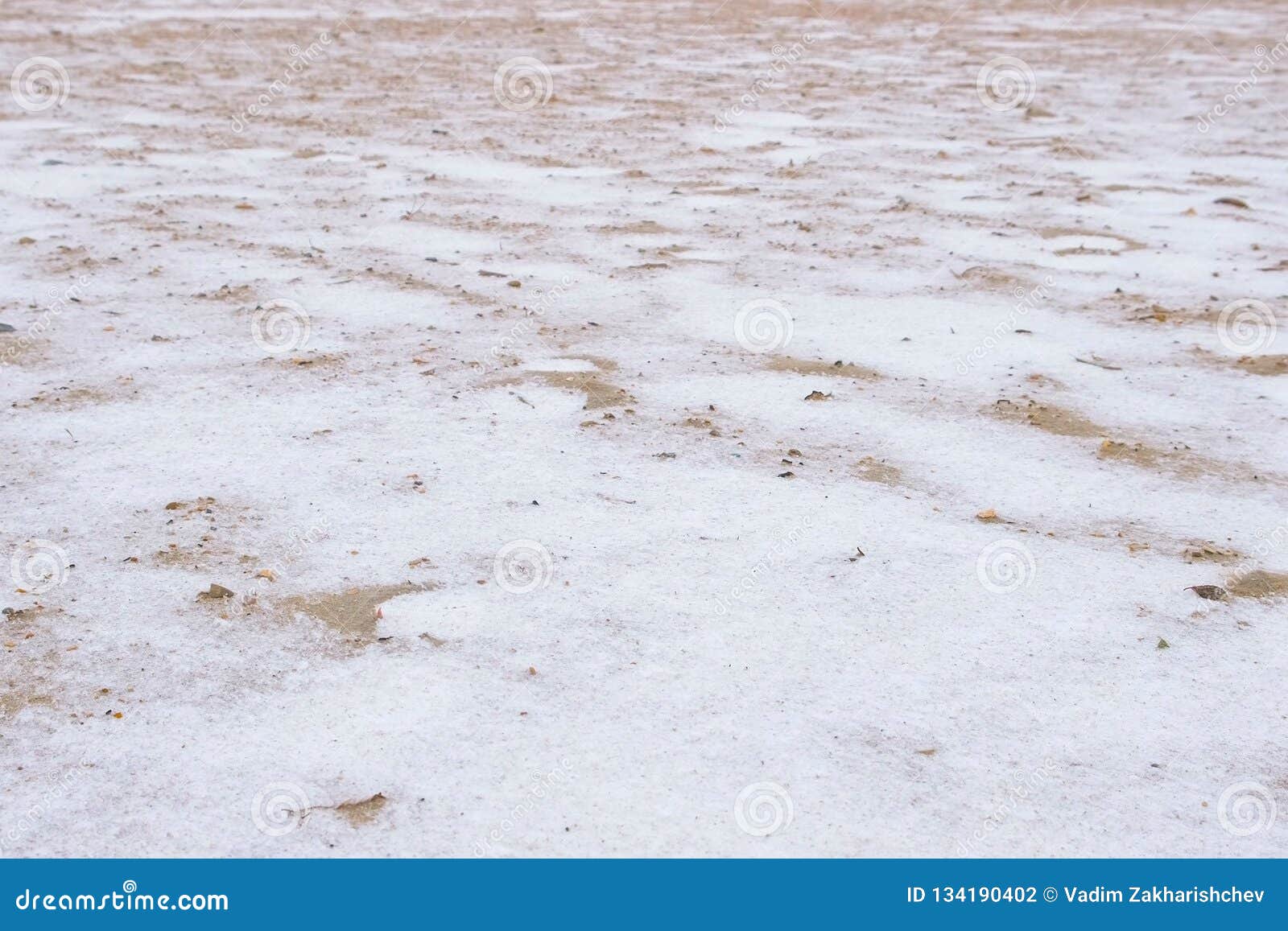 Sand Beach with Snow on the Sand Close-up View. Stock Photo - Image of ...