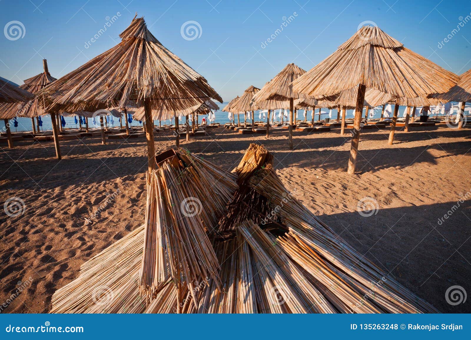 Sand beach with umbrella. stock photo. Image of famous - 135263248