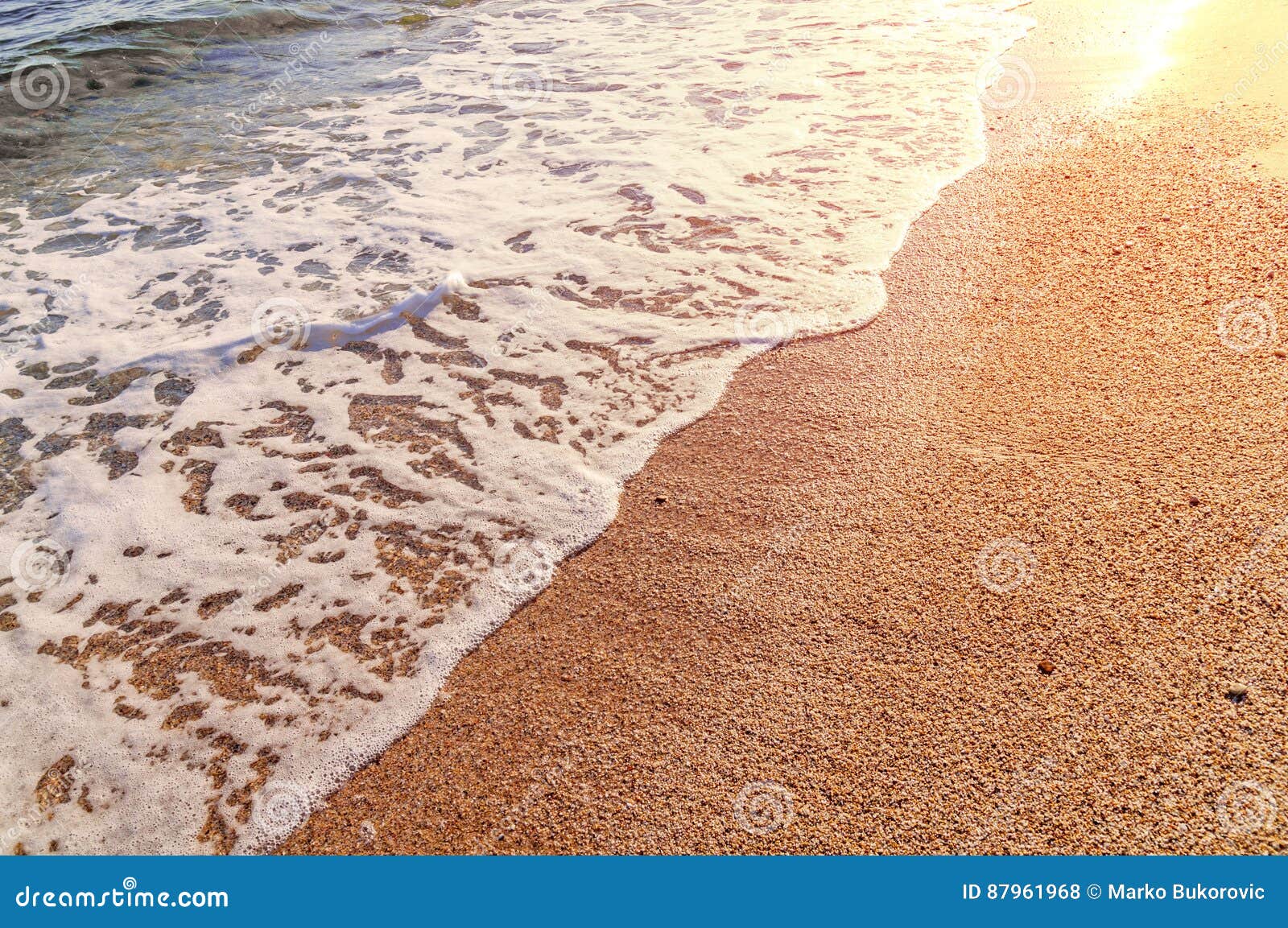 Sand Beach with Wave in Greece Closeup with Burning Sun Stock Photo ...