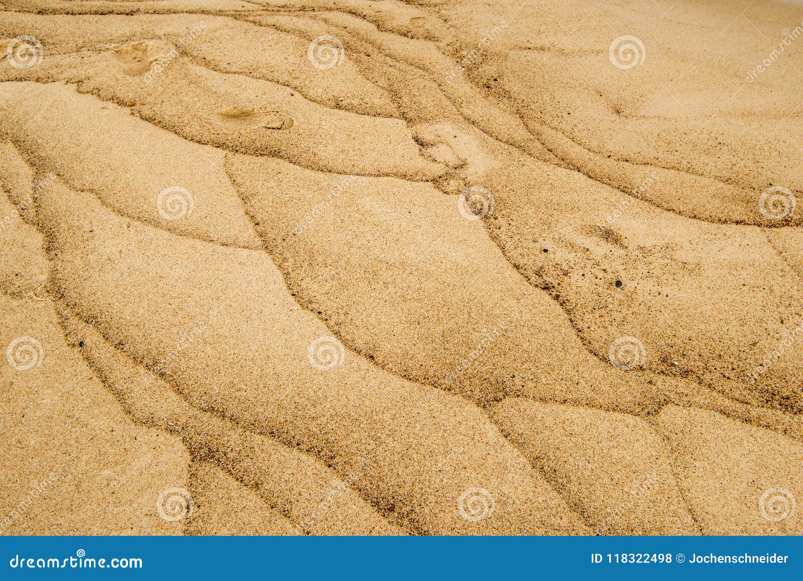 Sand of a Beach with Wave Patterns Stock Photo - Image of wide, surface ...