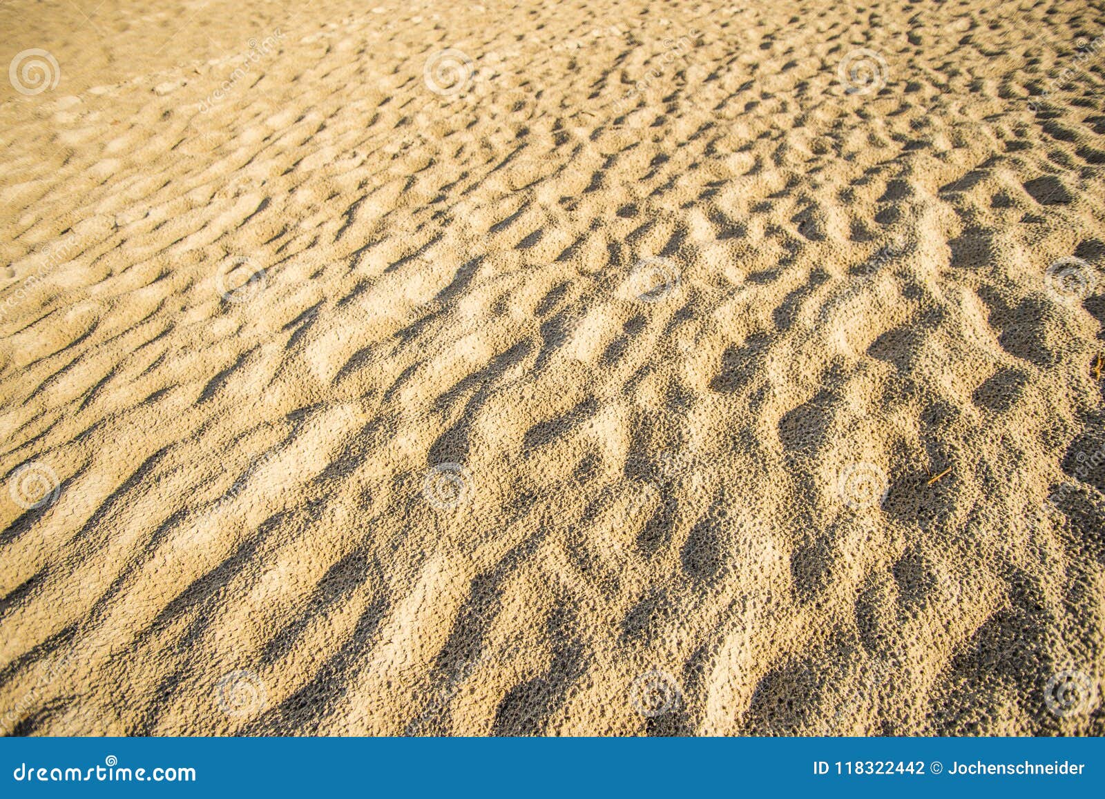 Sand of a Beach with Wave Patterns Stock Photo - Image of wide, text ...