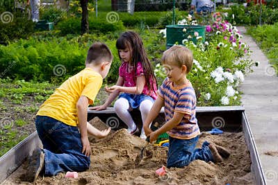 Sand-box stock image. Image of brother, sand, garden, happiness - 1242081