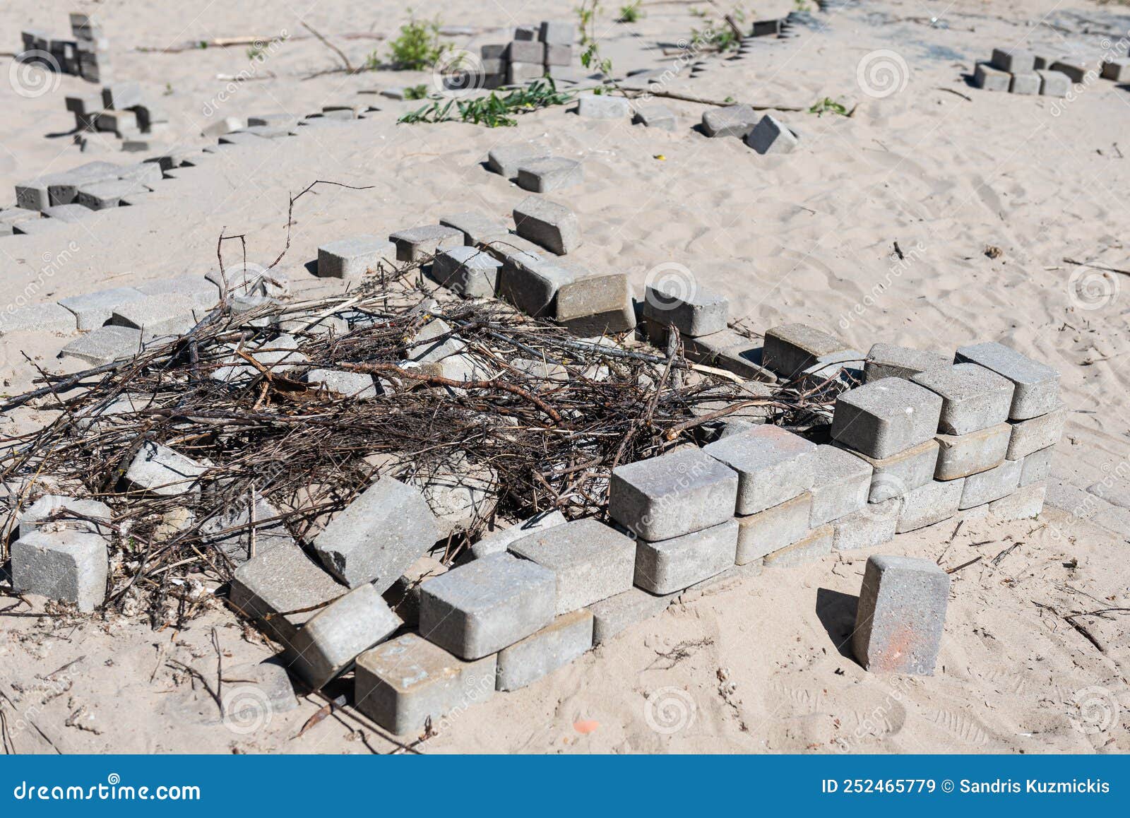 Sand, Bricks and Branches on the Beach. Fire Place Stock Image - Image ...