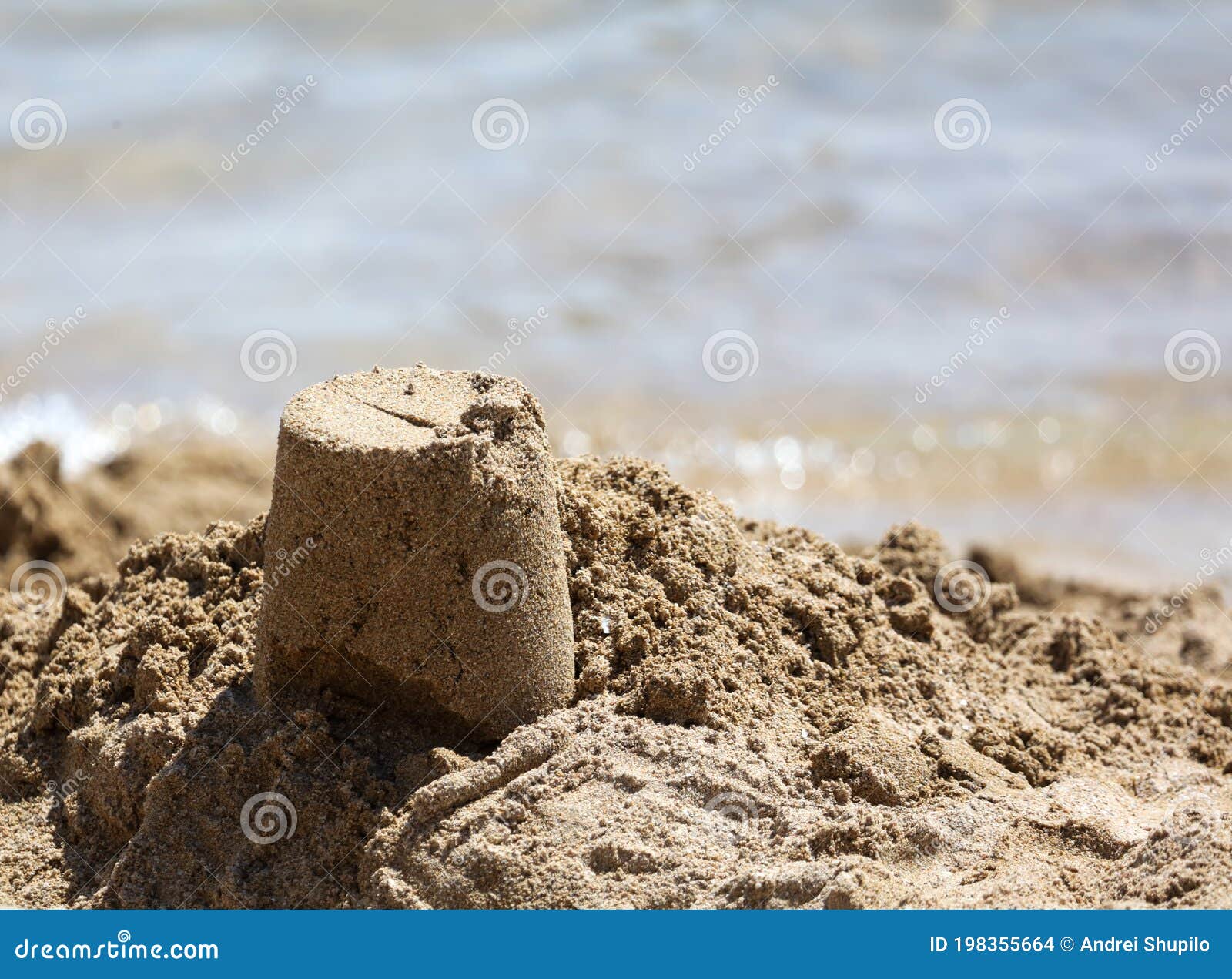 Sand building on the beach stock photo. Image of castle - 198355664
