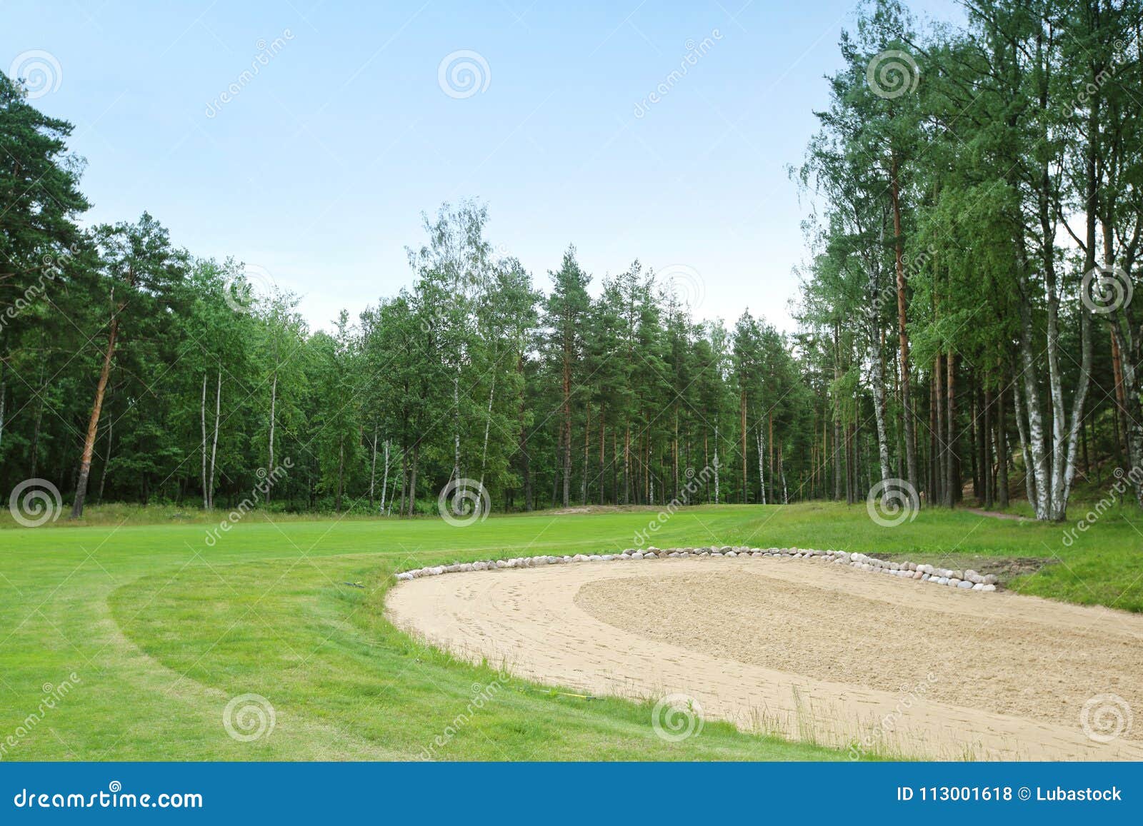 Sand bunker on golf course stock photo. Image of fairway - 113001618