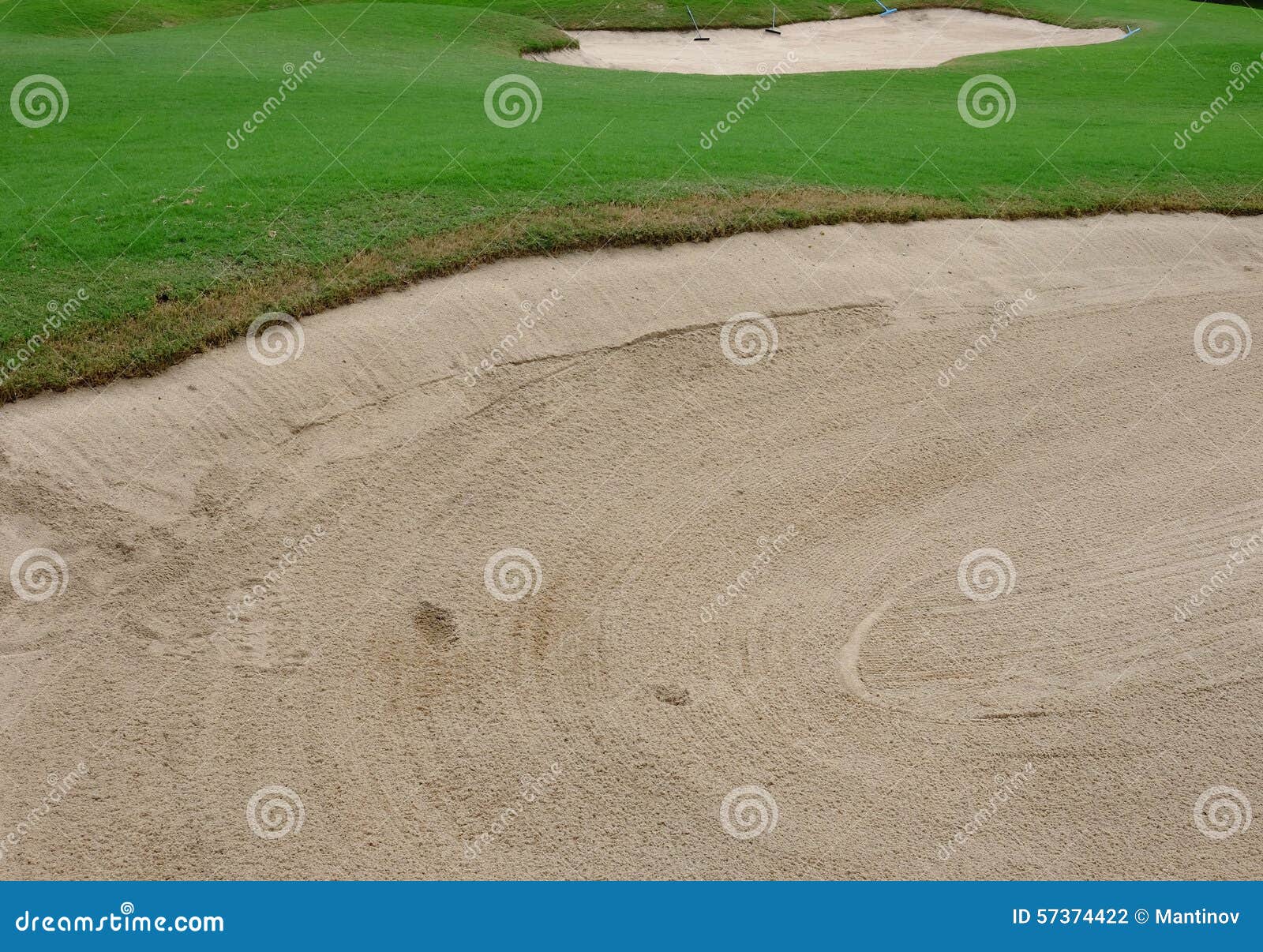 Sand bunker in golf course stock photo. Image of countryside - 57374422