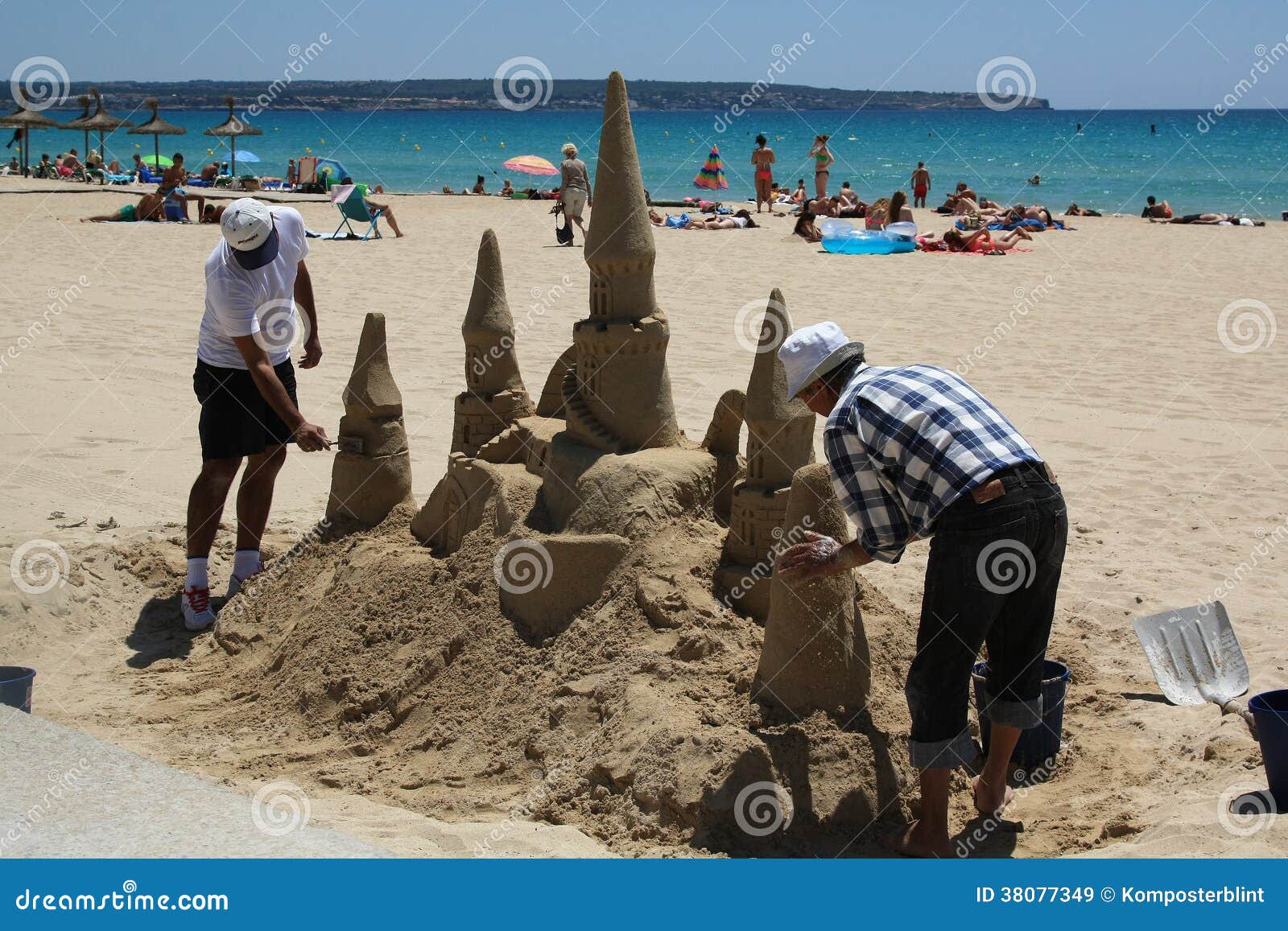 Two Men Build a Sand Castle on the Beach on a Sunny Day Editorial Stock ...