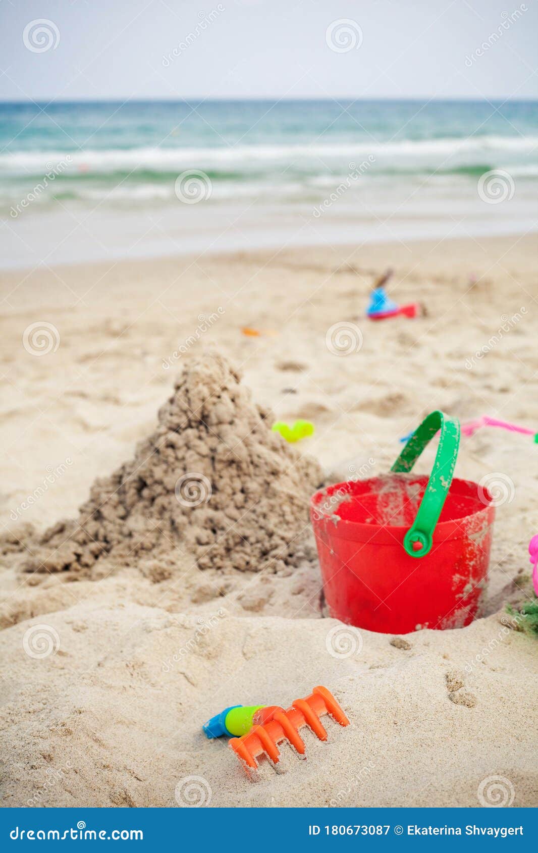 Sand castle on the beach stock image. Image of constructing - 180673087