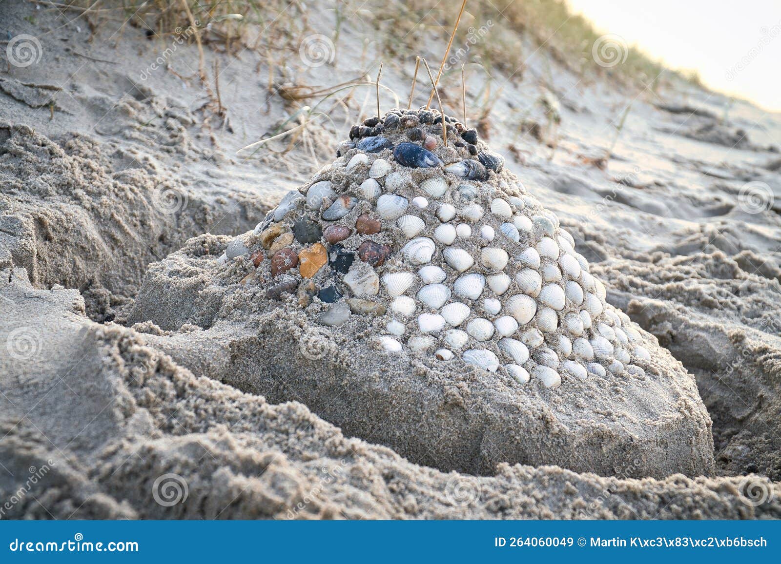 Sand Castle with Shells and Sand. Moat Around the Castle in Front of ...