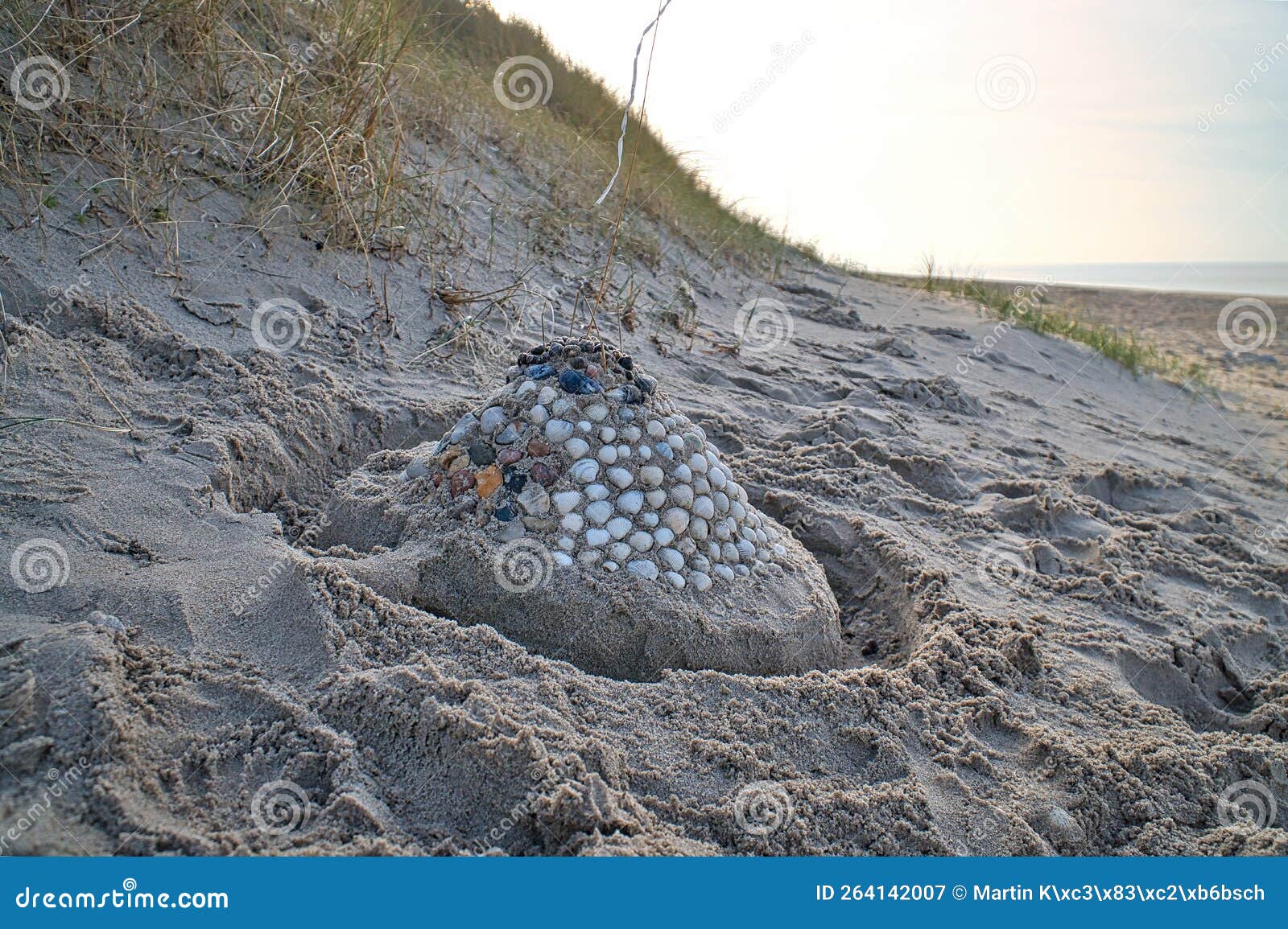 Sand Castle with Shells and Sand. Moat Around the Castle in Front of ...