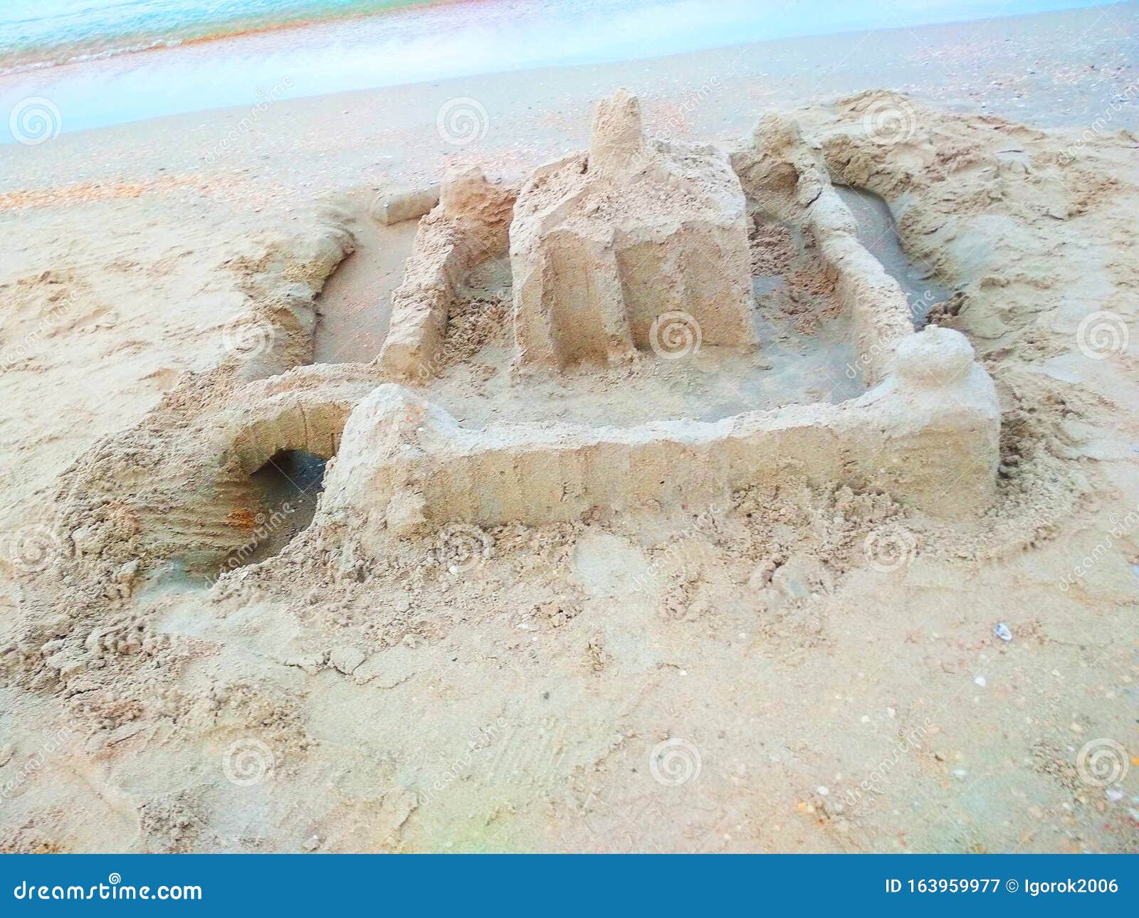 Sand Castle on the Shore of the Sea of Rectangular Shape. Stock Image ...