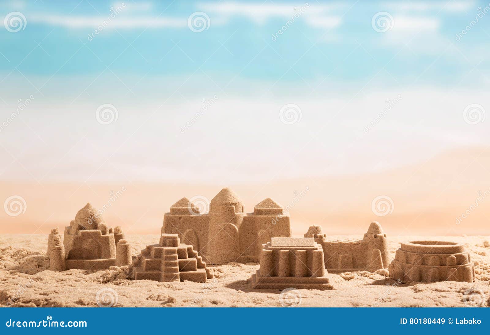 Castles And Coliseum With Flag, Rubber Duck In Sand. Royalty-Free Stock ...