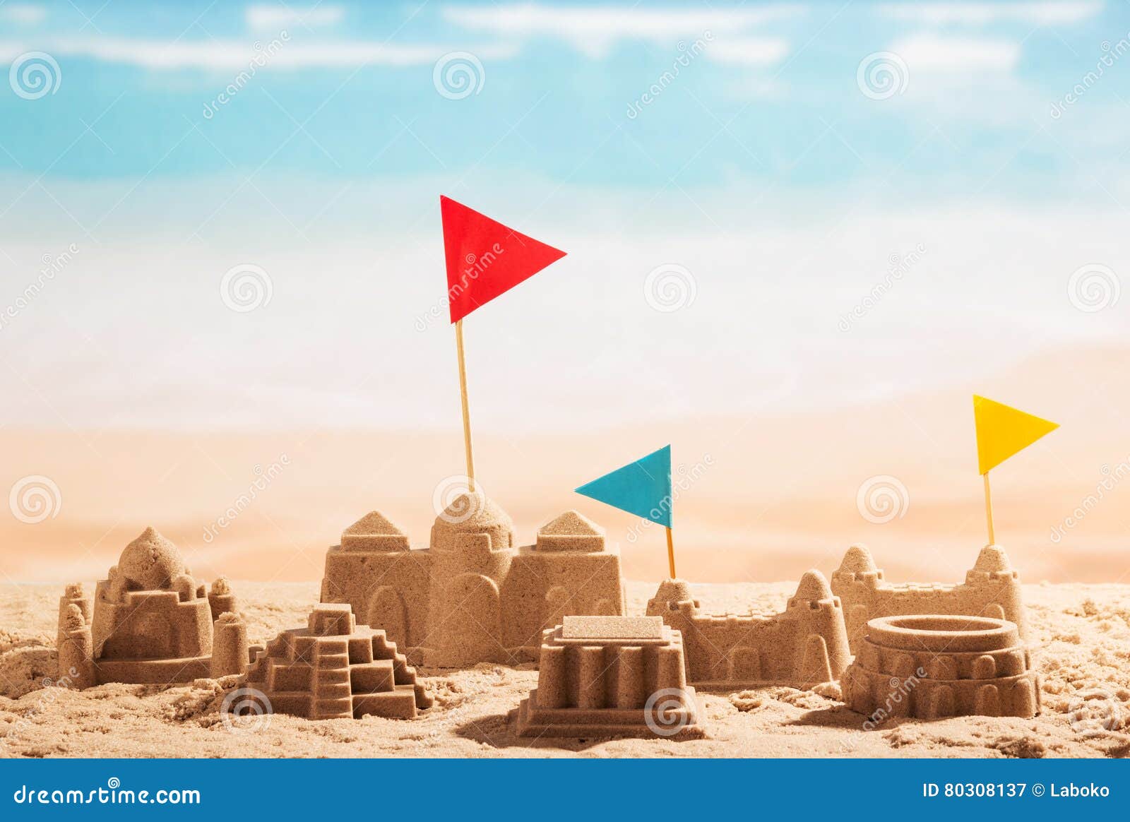 Castles And Coliseum With Flag, Rubber Duck In Sand. Royalty-Free Stock ...