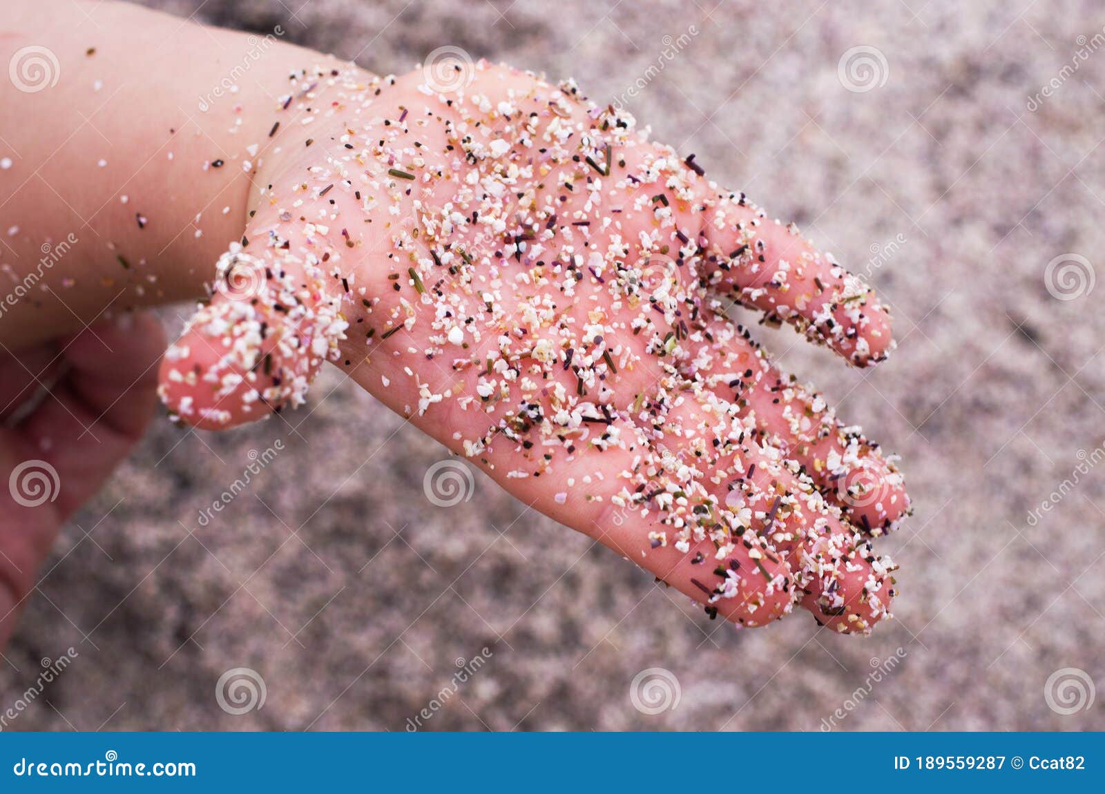 Sand on child hand stock image. Image of beautiful, leisure - 189559287