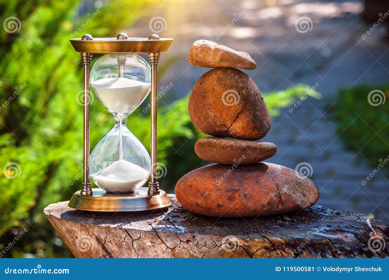 Sand Clock and Pebble Tower Stock Image - Image of business, hourglass ...