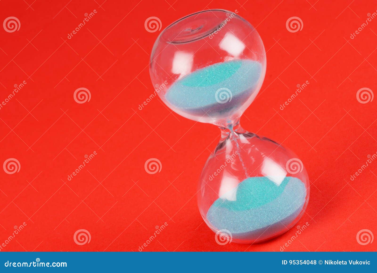 Sand Clock on Red Background Stock Photo - Image of background, object ...